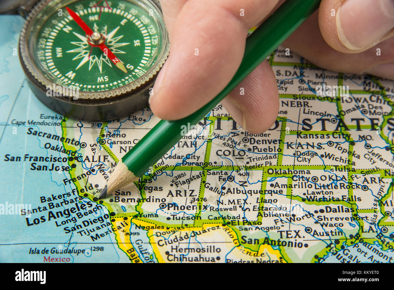 USA map with pencil pointing on various us city Stock Photo - Alamy