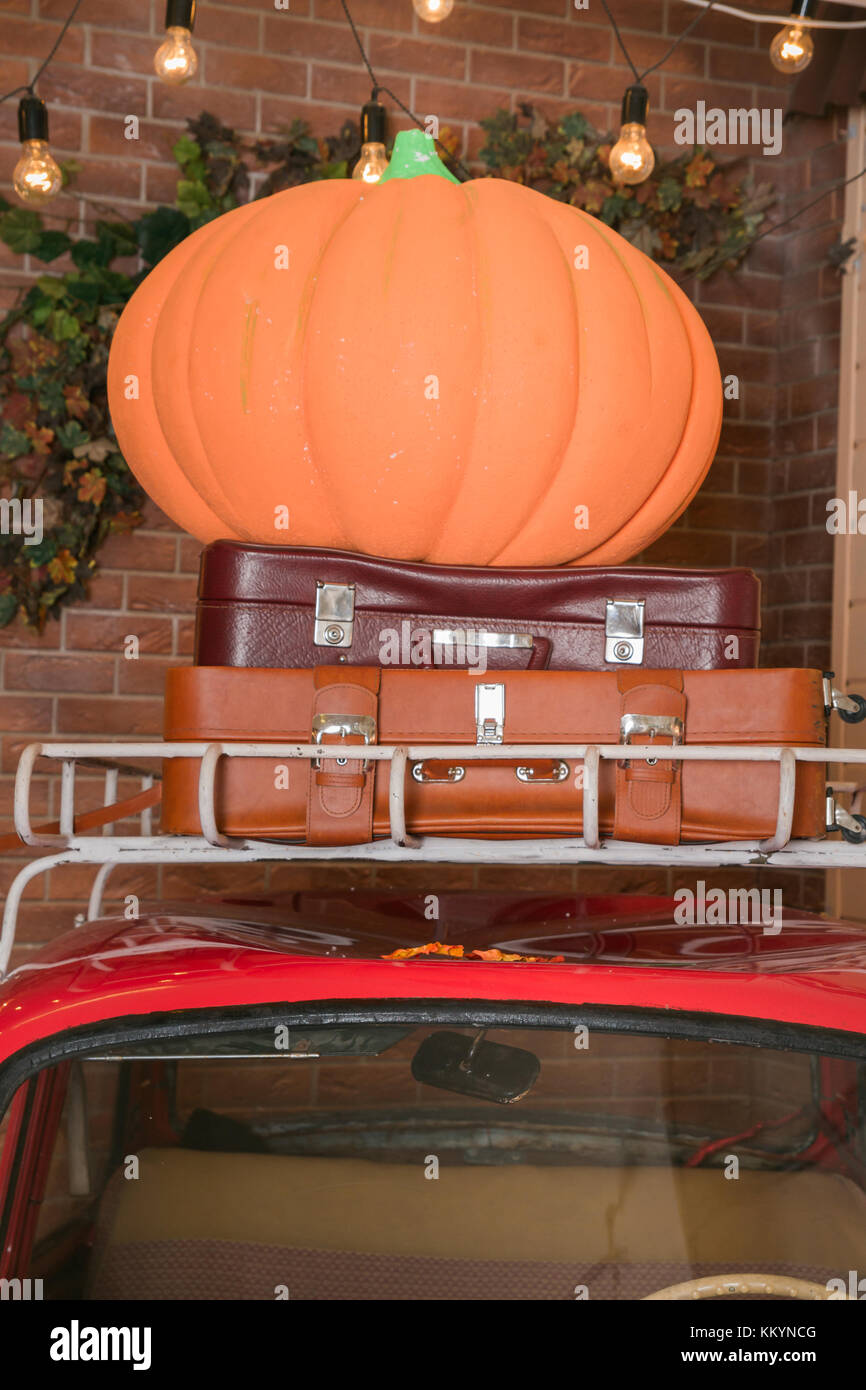 Retro red car on autumn scenery in front of the house Stock Photo - Alamy