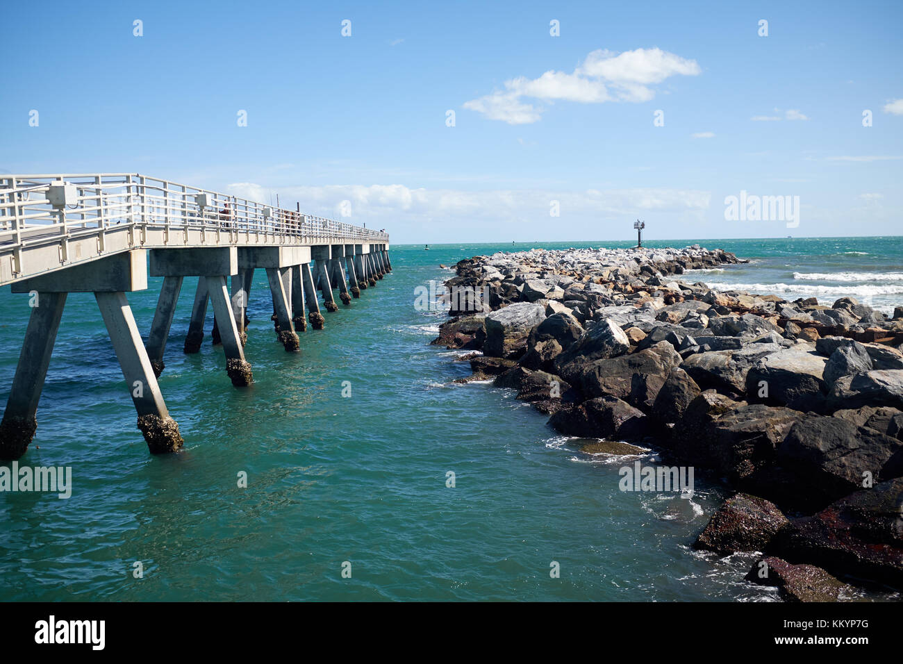Natural rock breakwater, a part of the coastal defences or wall of a ...