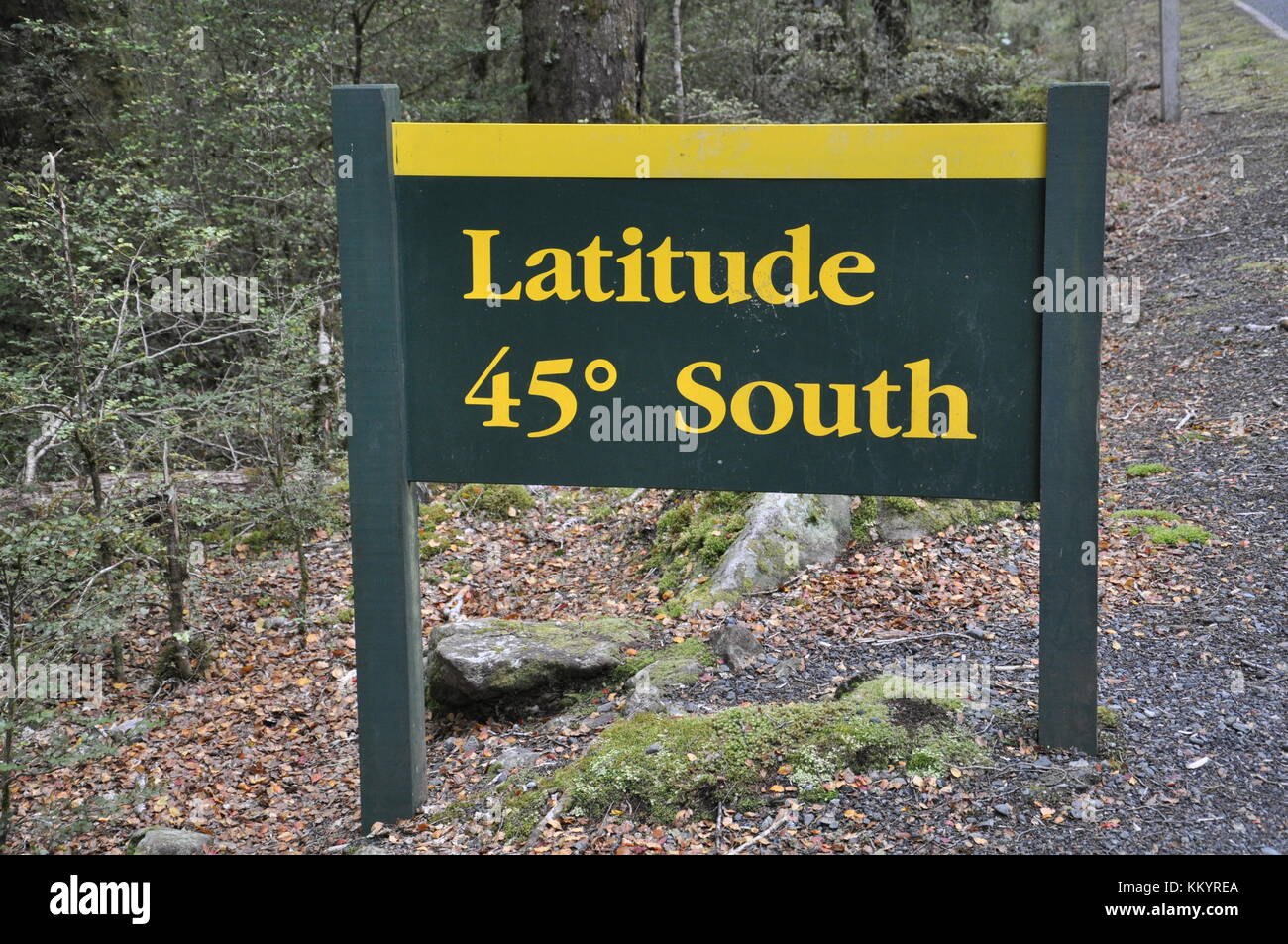 Latitude 45 degrees south road sign along the Milford Sound highway ...