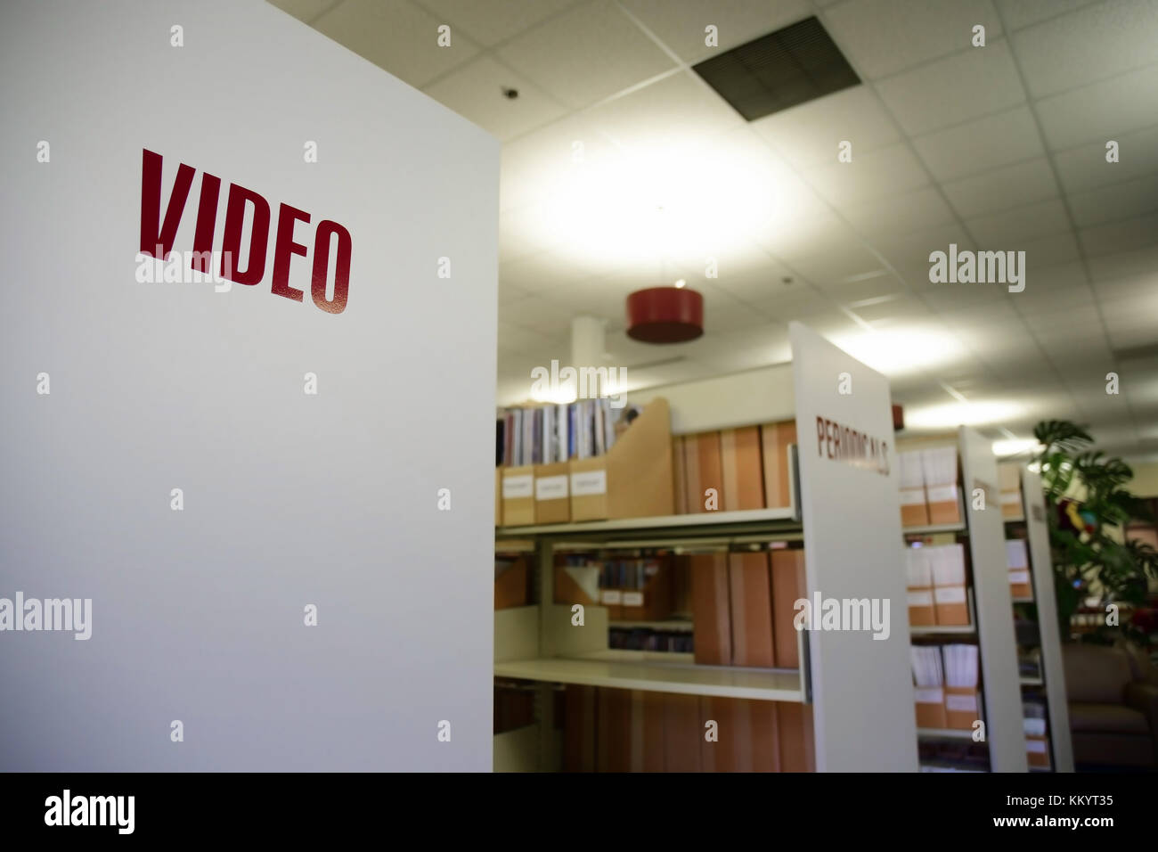 Video and periodicals sections at a community college library Stock ...