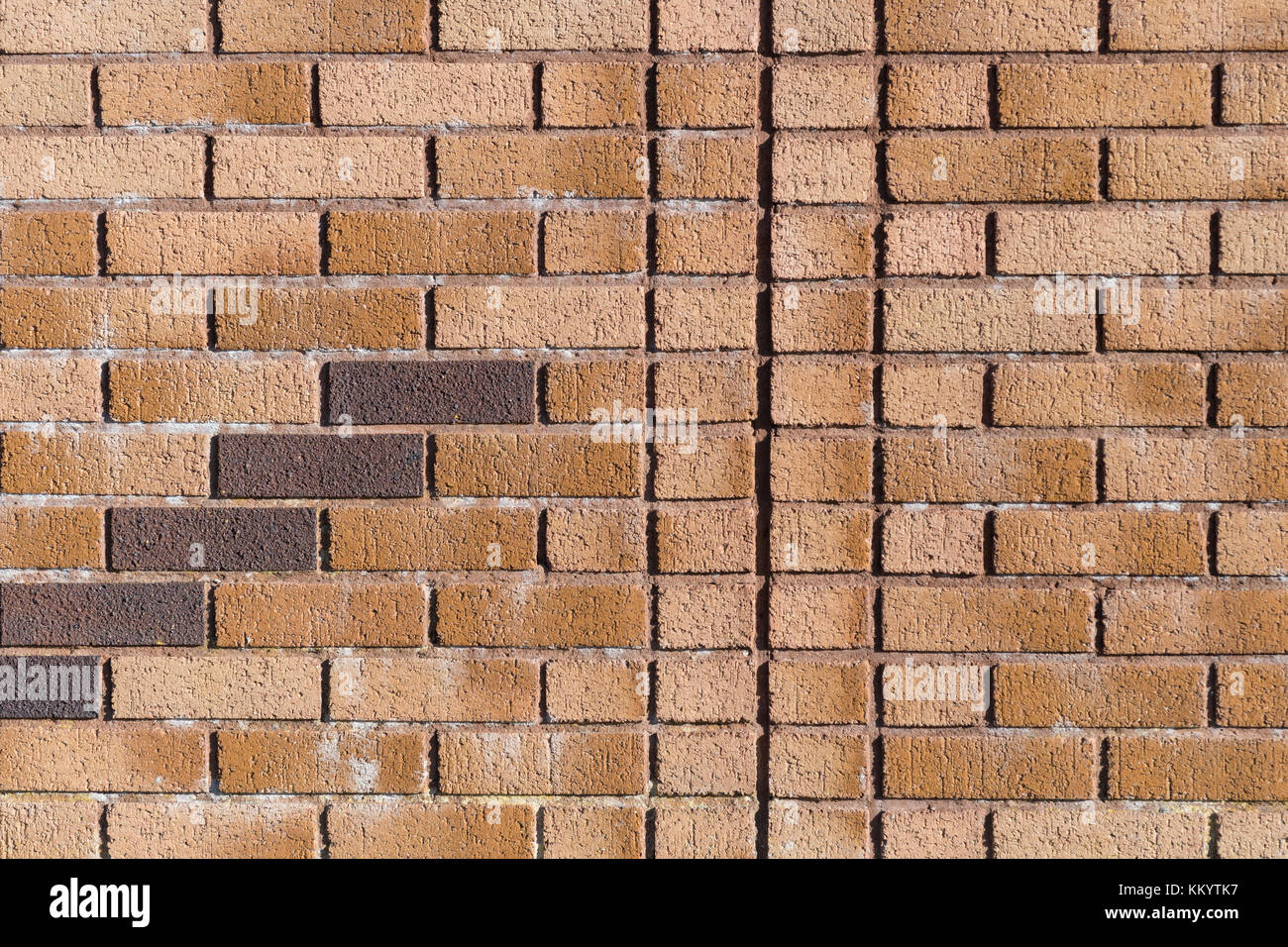 Red brick patterns and lines in bright sunshine - as brickwork abstract ...