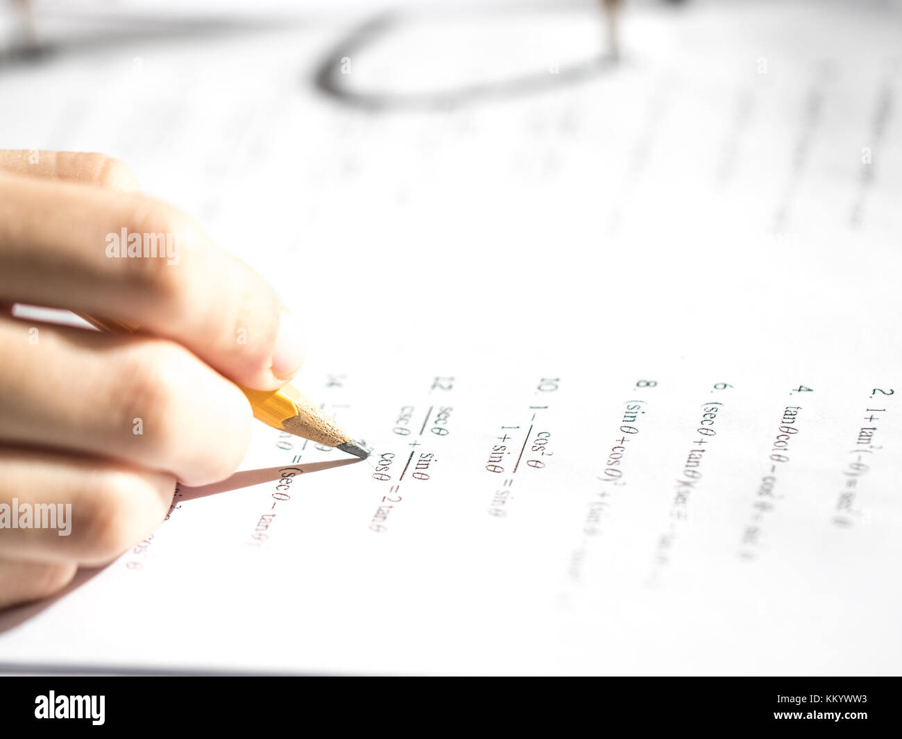 Studying for challenging Math Test Stock Photo - Alamy