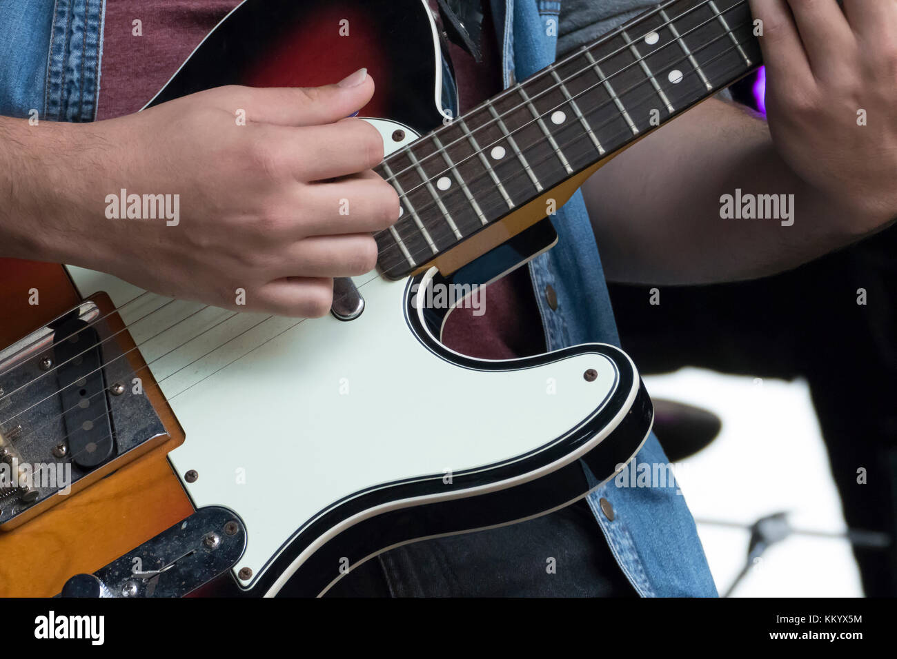 Hand from a guitar player with guitar in Detail Stock Photo - Alamy