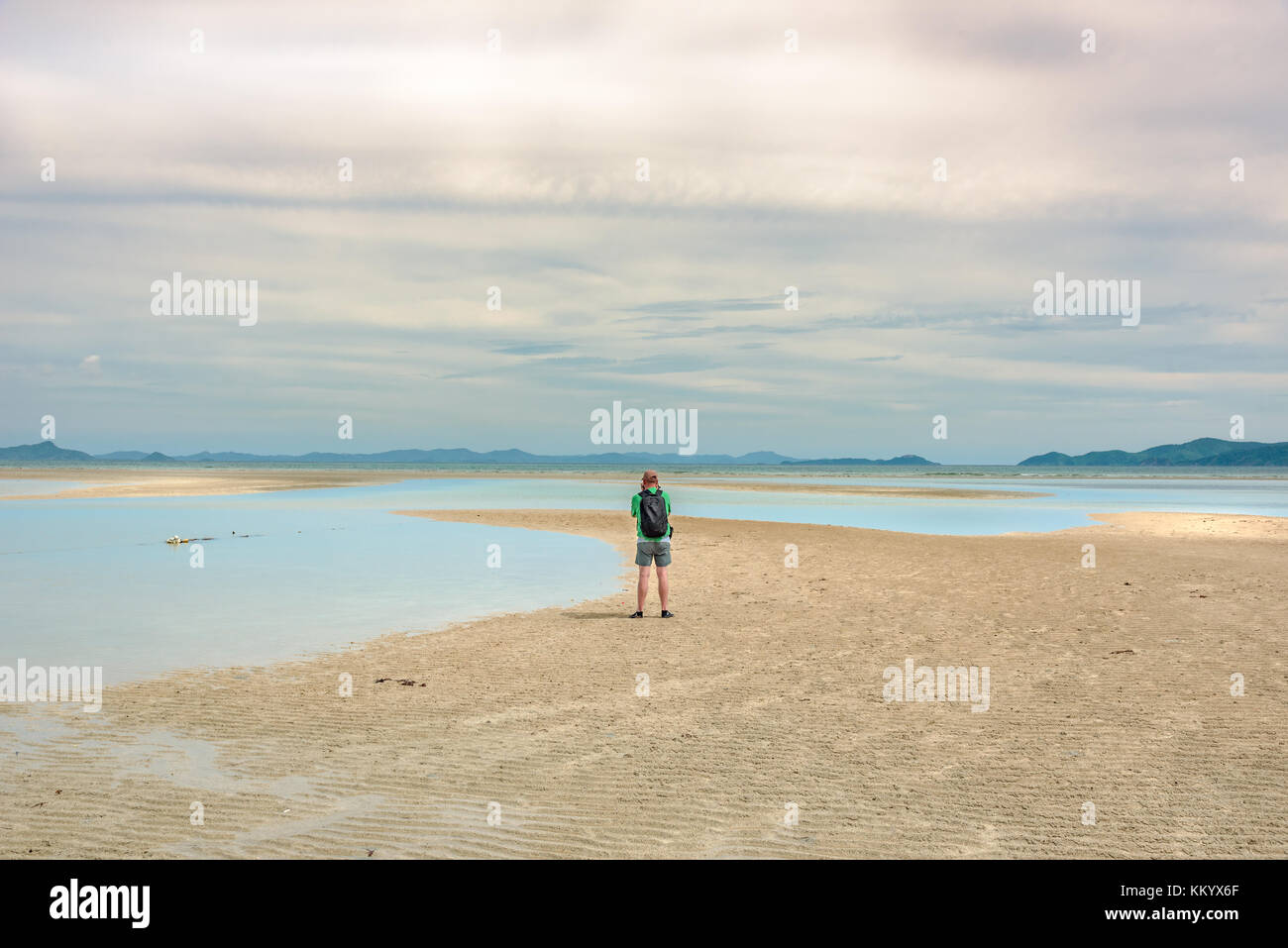 Man stand alone on a beach near El Nido, Palawan Stock Photo - Alamy