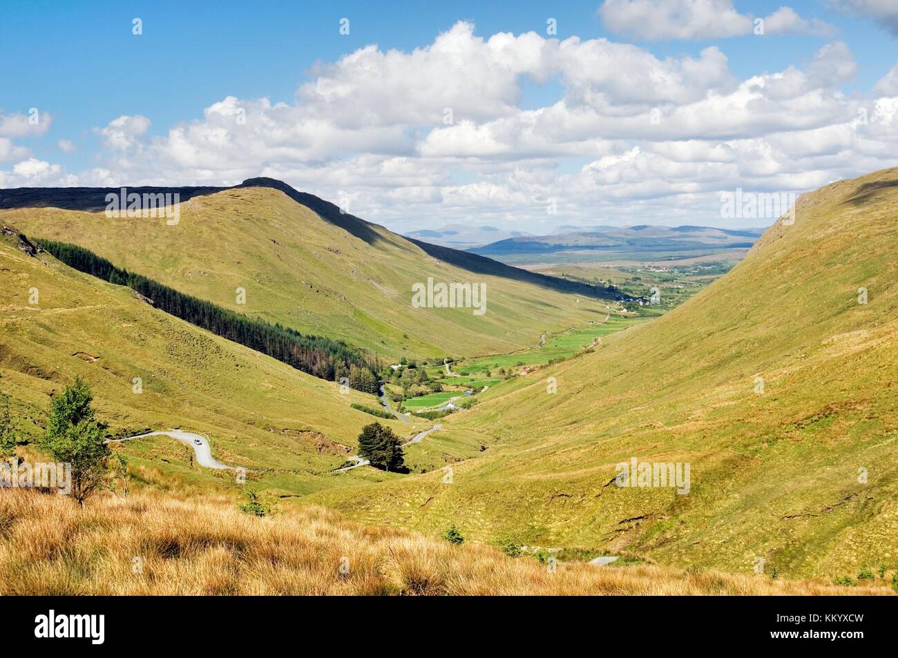 The mountain road from Glengesh Pass leads northeast toward the town of ...