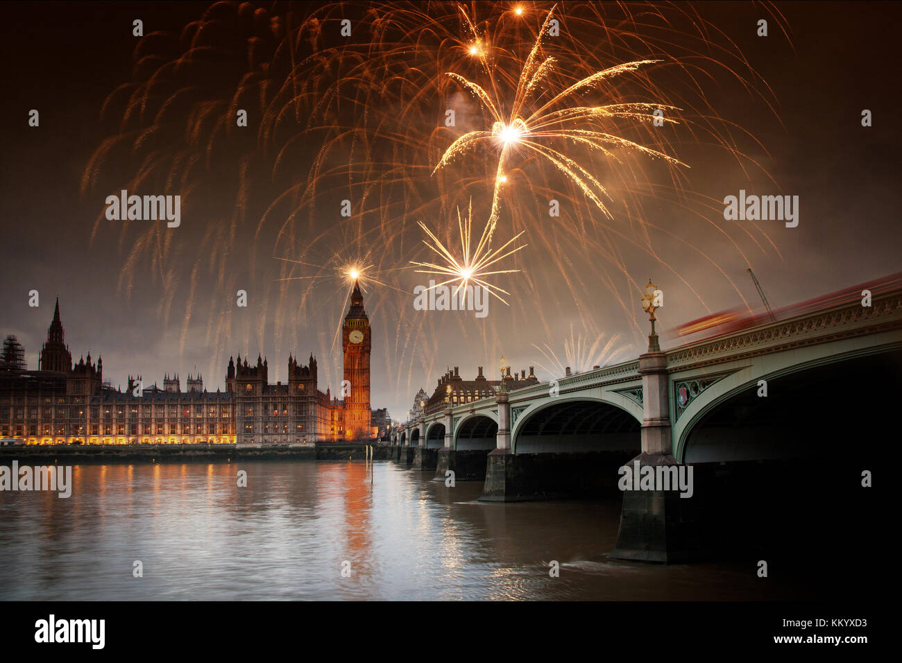 explosive fireworks display fills the sky around Big Ben. New Year's ...