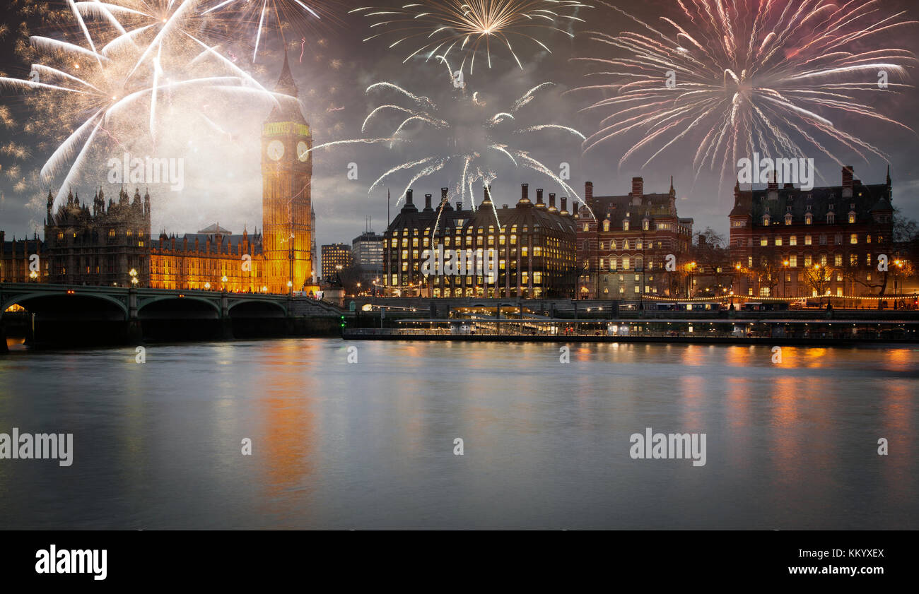explosive fireworks display fills the sky around Big Ben. New Year's ...