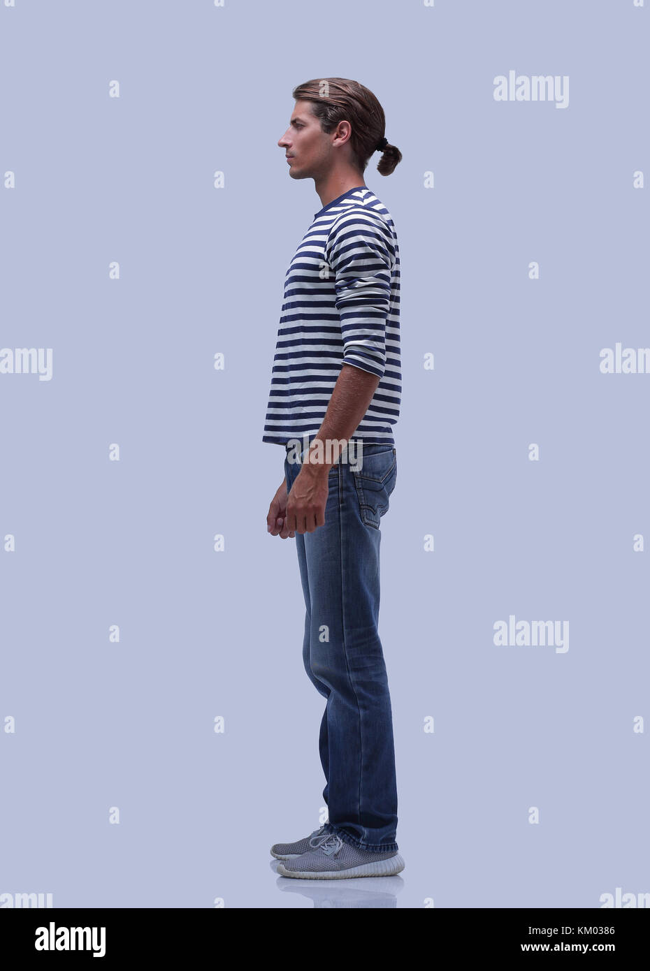 Side view. serious young man Stock Photo - Alamy