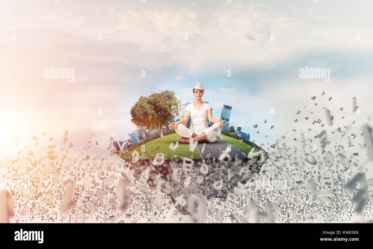 Young woman keeping mind conscious Stock Photo - Alamy