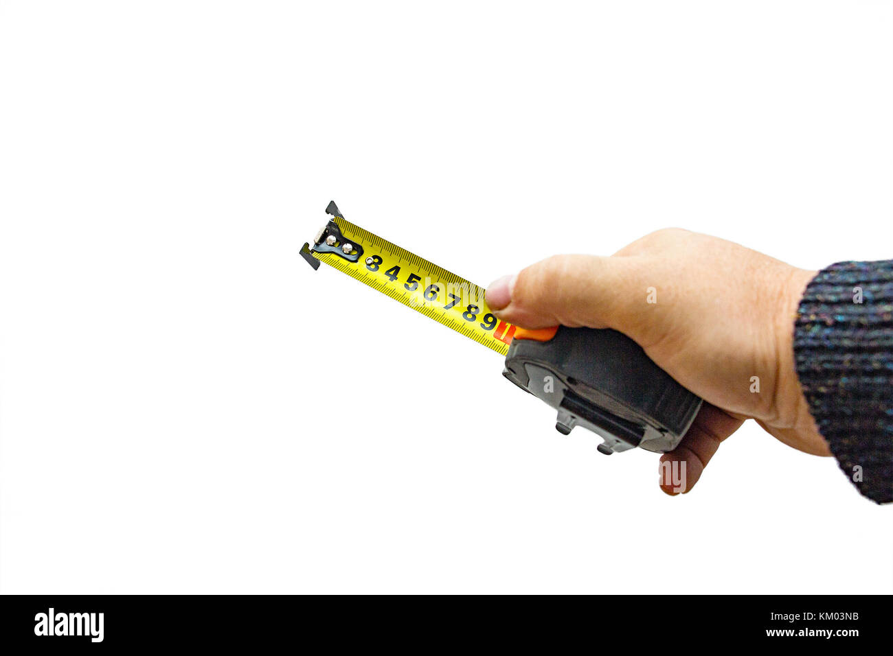 Hand with a tape measure on white Stock Photo - Alamy