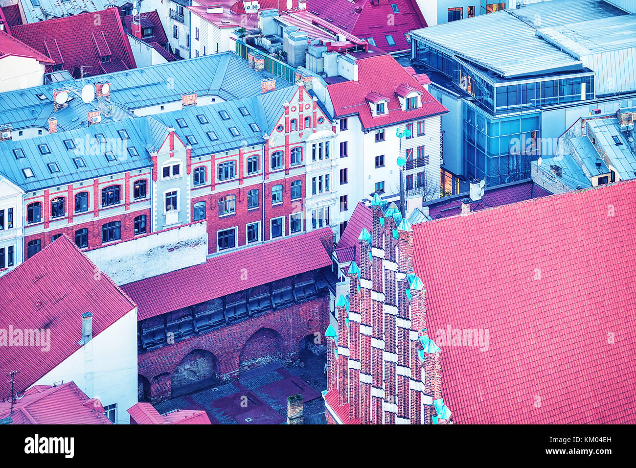 Riga Old Town with red roof tile in the evening Stock Photo - Alamy
