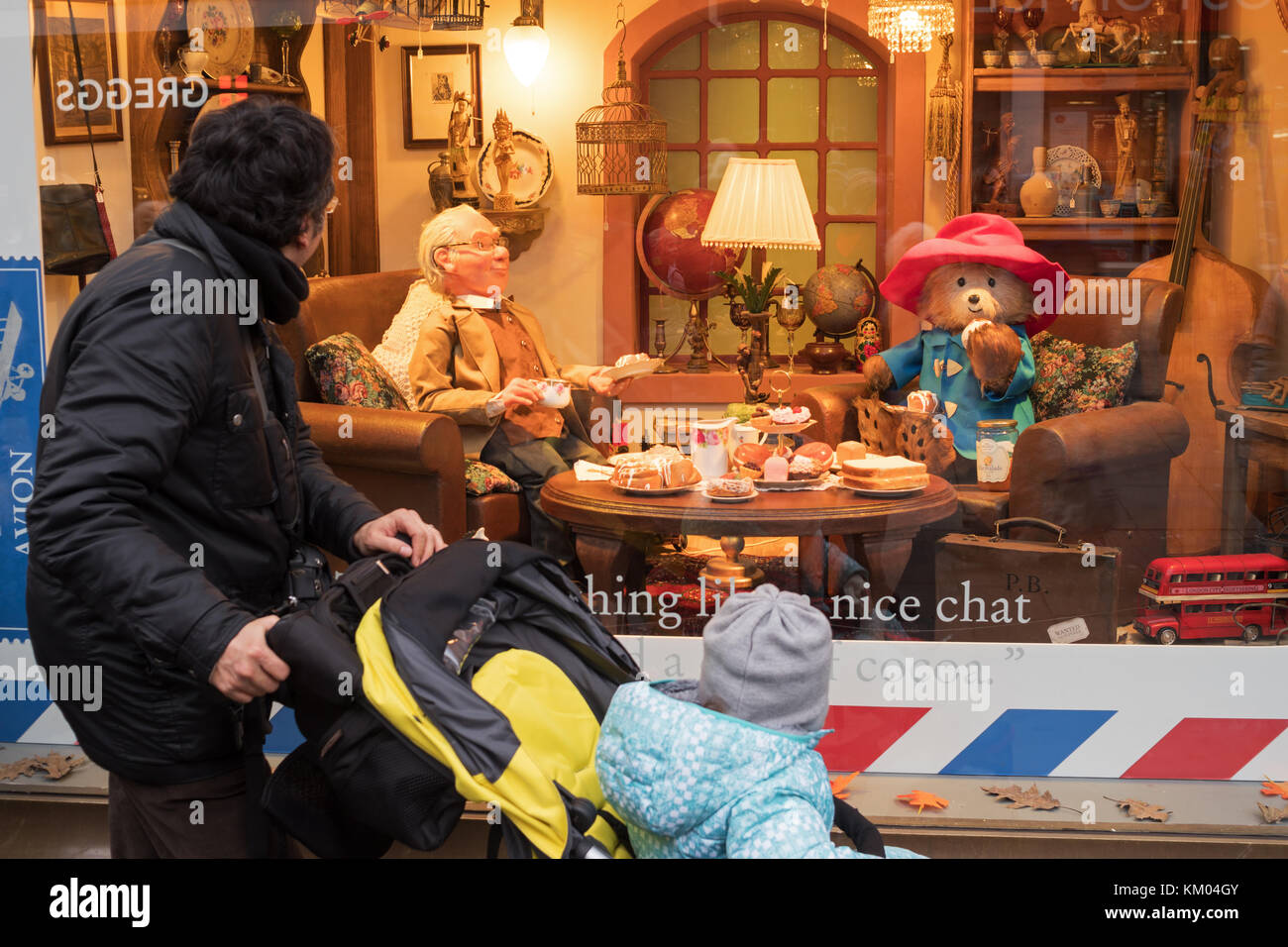 People looking at Fenwick's 2017 Paddington Bear Christmas display ...