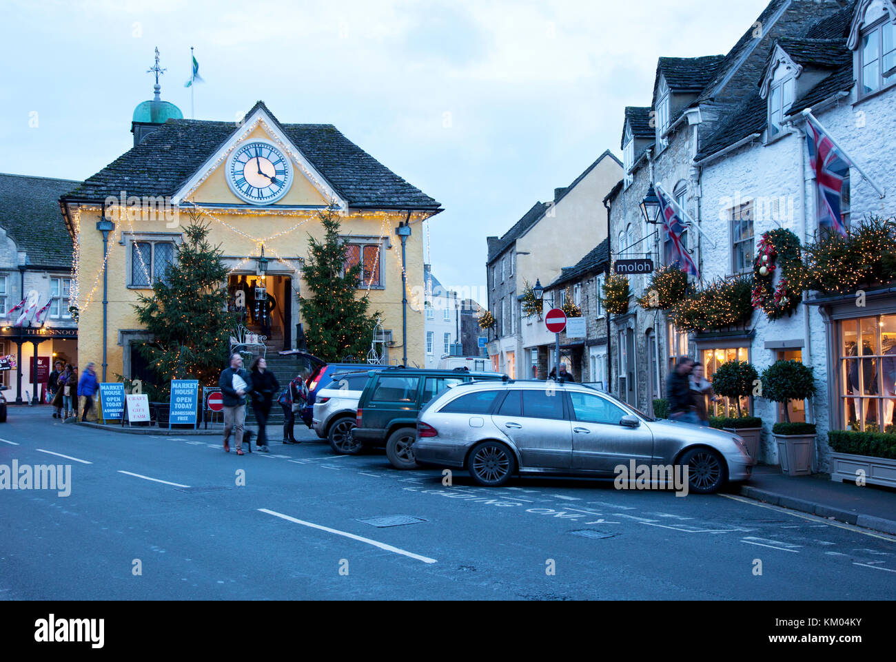 Christmas shoppers browse the festive Market House and neighbouring ...