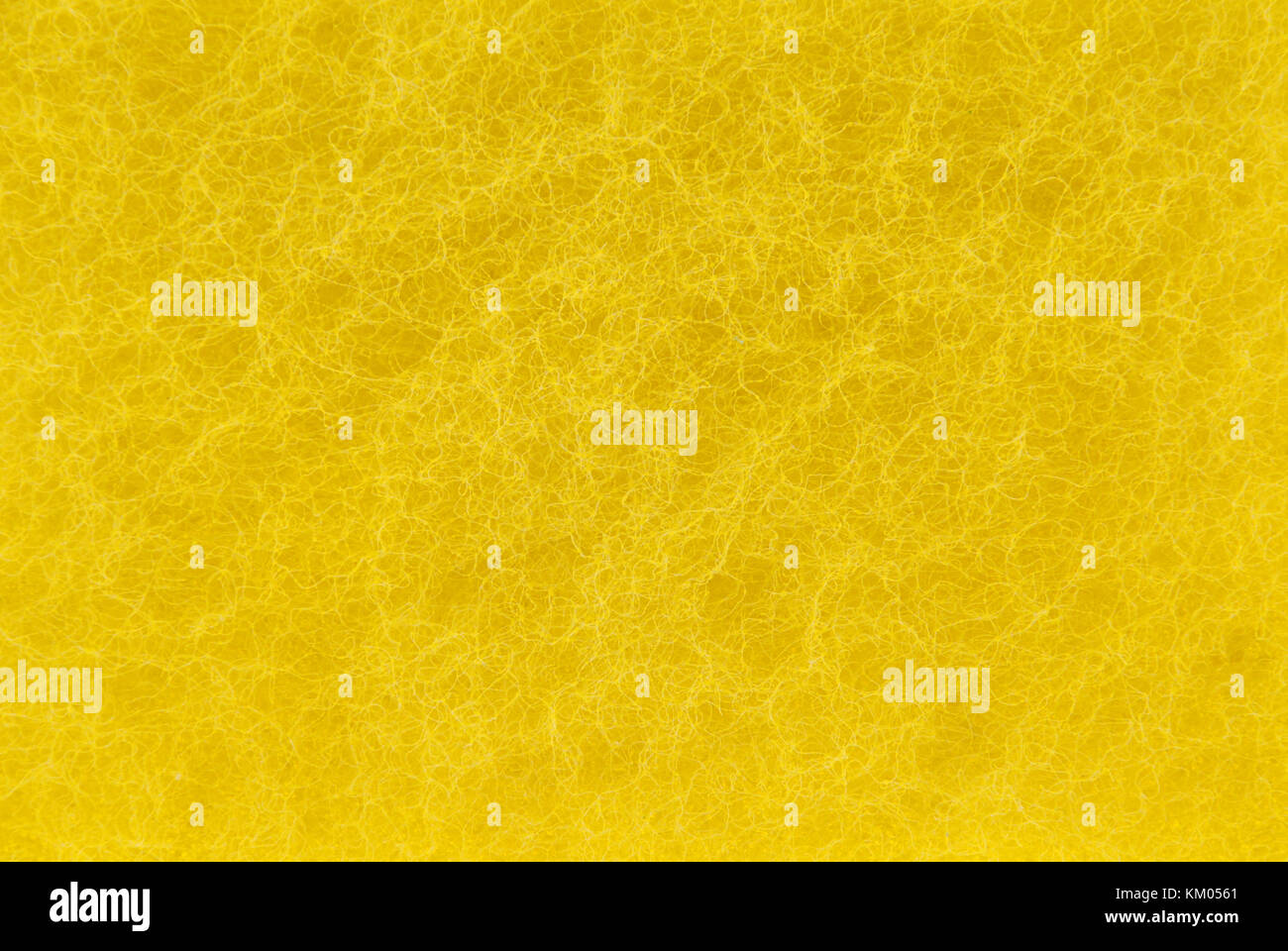 Yellow texture cellulose foam sponge. Background Stock Photo - Alamy