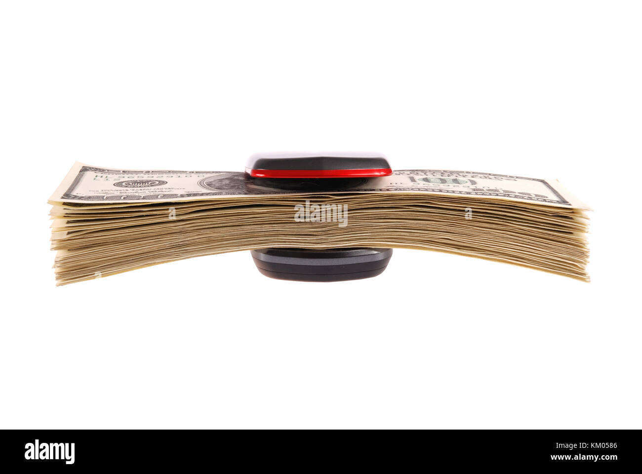 Cell phone and dollars close up. On white background Stock Photo - Alamy