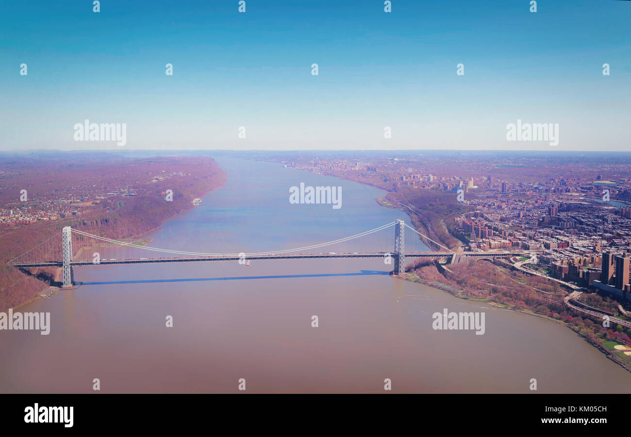 Aerial view on Williamsburg Bridge over East River between Brooklyn and ...