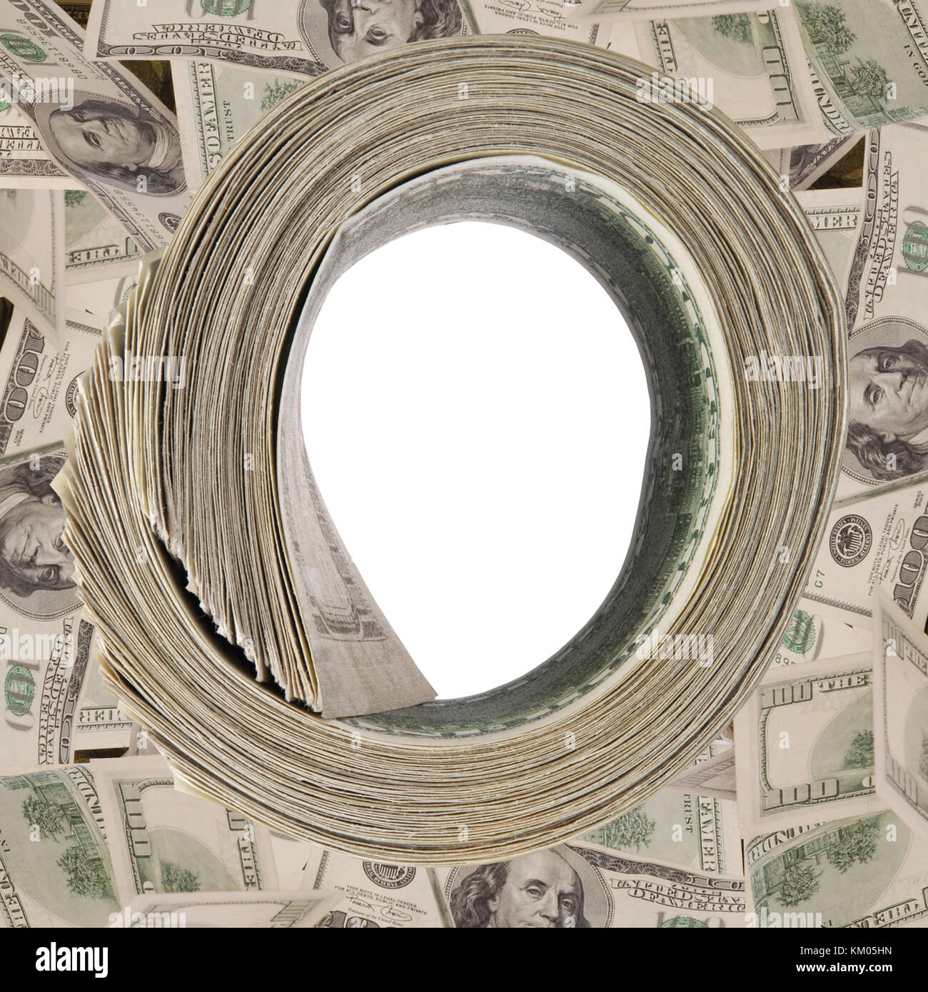 Money roll, roll of bills, roll of dollar bills. On dollars background ...