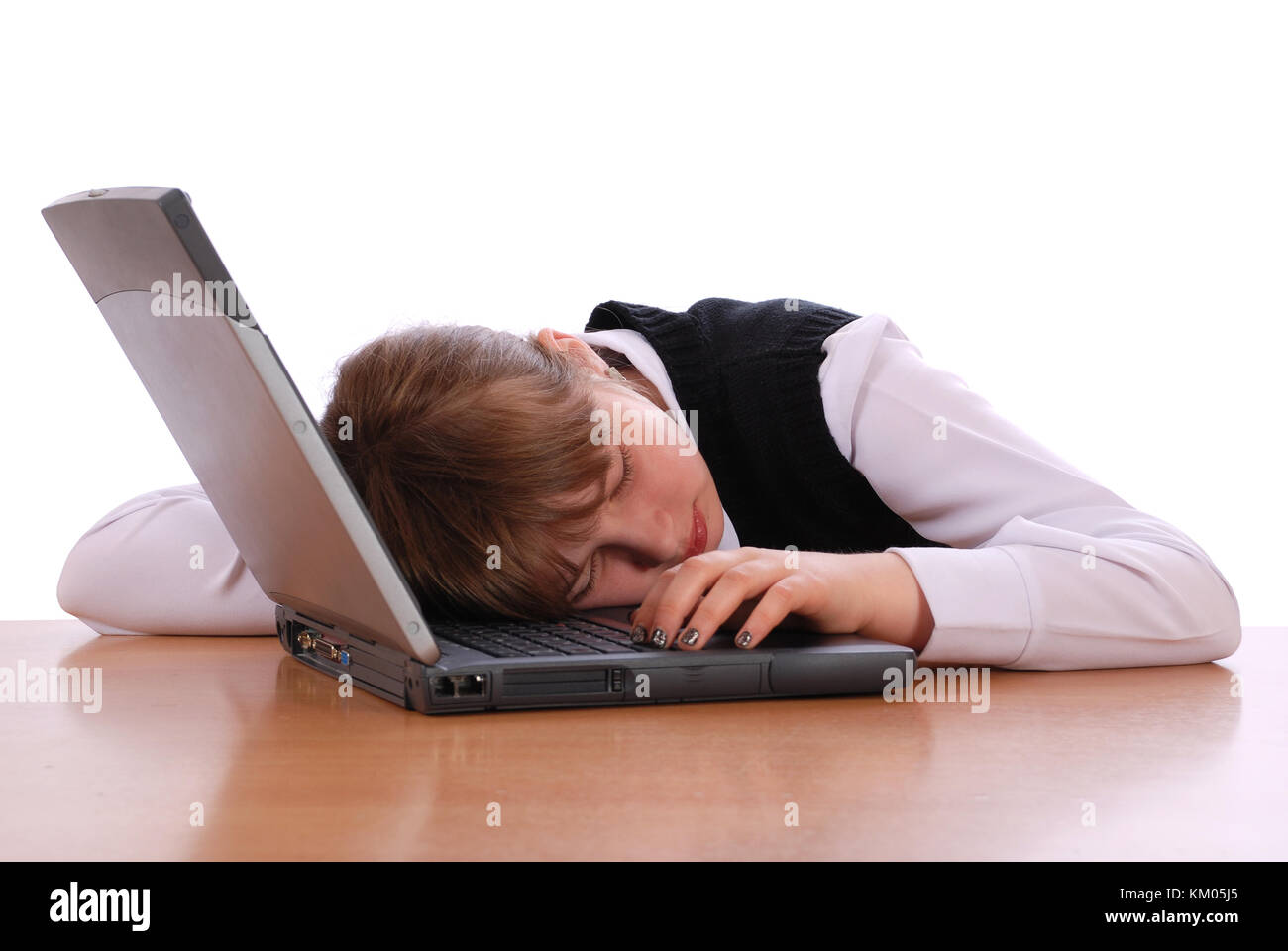 Girl sleeps having put a head on laptop. On a white background Stock ...