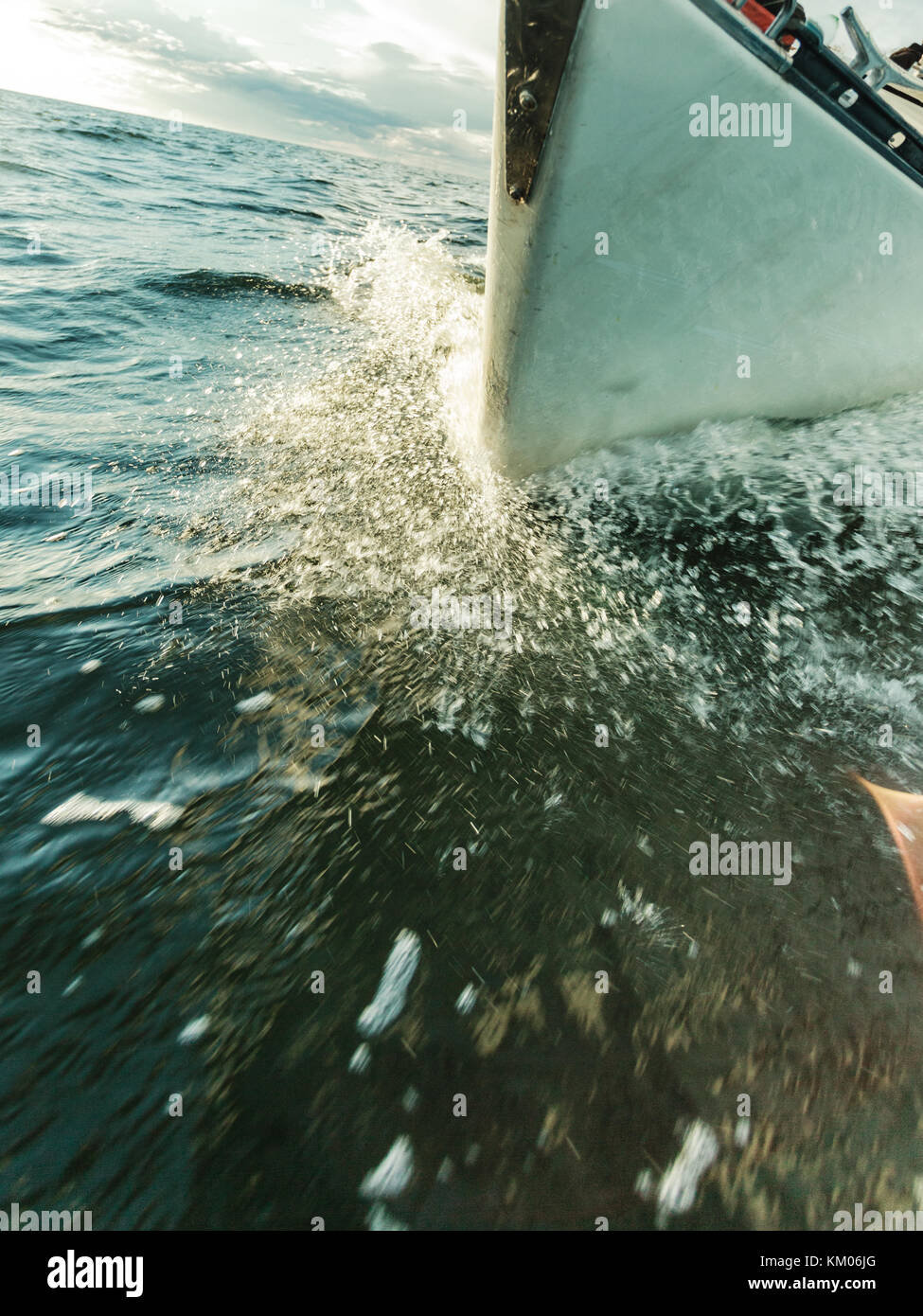 Yachting on sail boat bow stern shot splashing sea water. Sporty ...