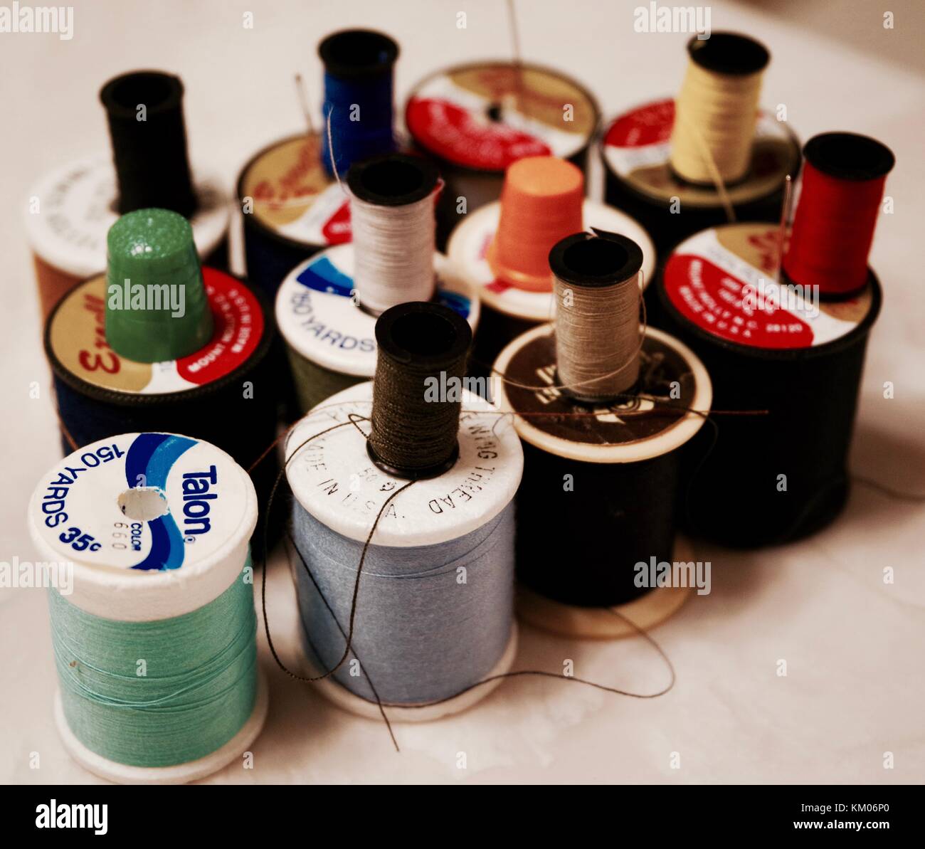 Spools of thread with needle hi-res stock photography and images - Alamy