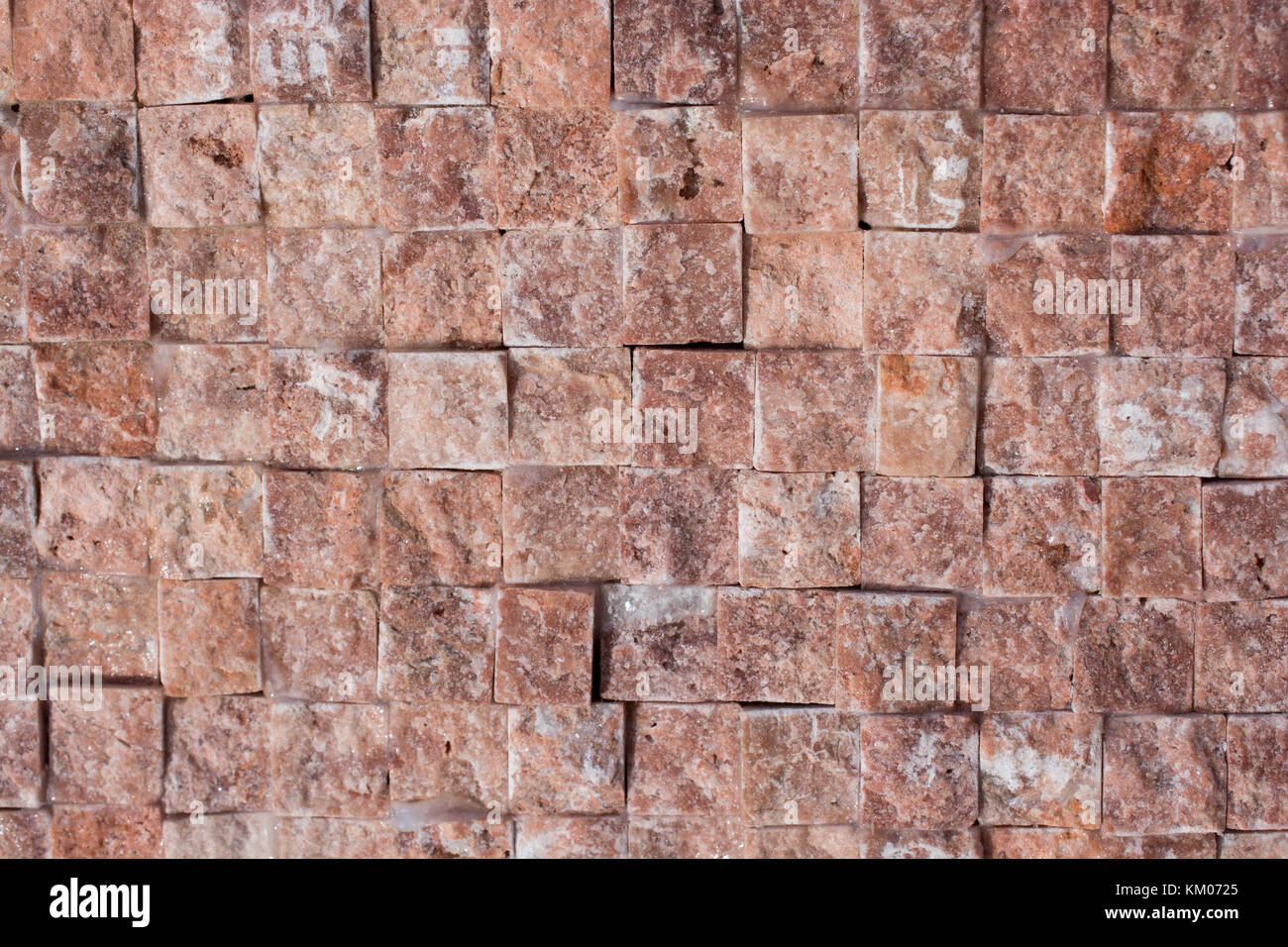 Decorative cubic stone wall as background texture Stock Photo - Alamy