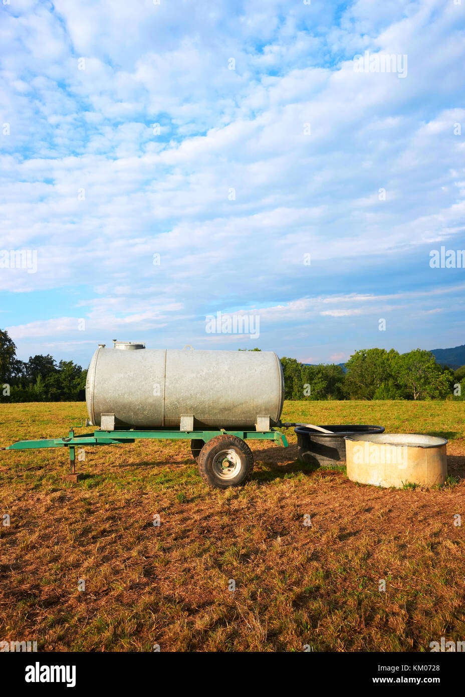 Water trough for drinking for cow cattle at the field, Franche Comte ...