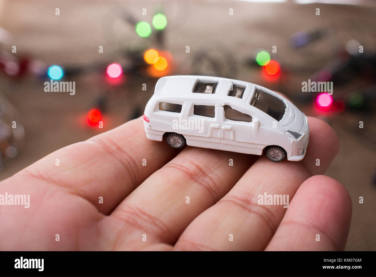 Toy car as a transportation device with lights behind Stock Photo - Alamy
