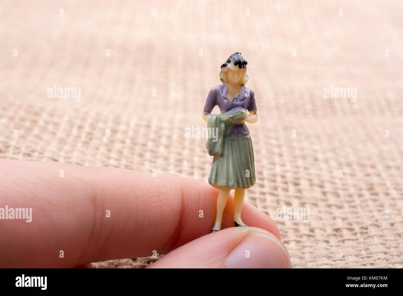Heart shaped gold color metal object in hand Stock Photo - Alamy