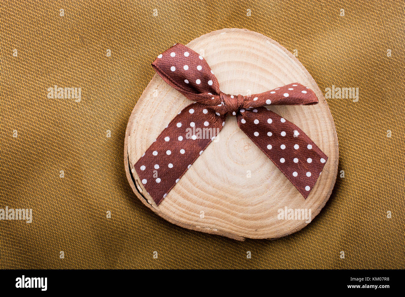 Wood Log cut in round thin pieces in view Stock Photo - Alamy