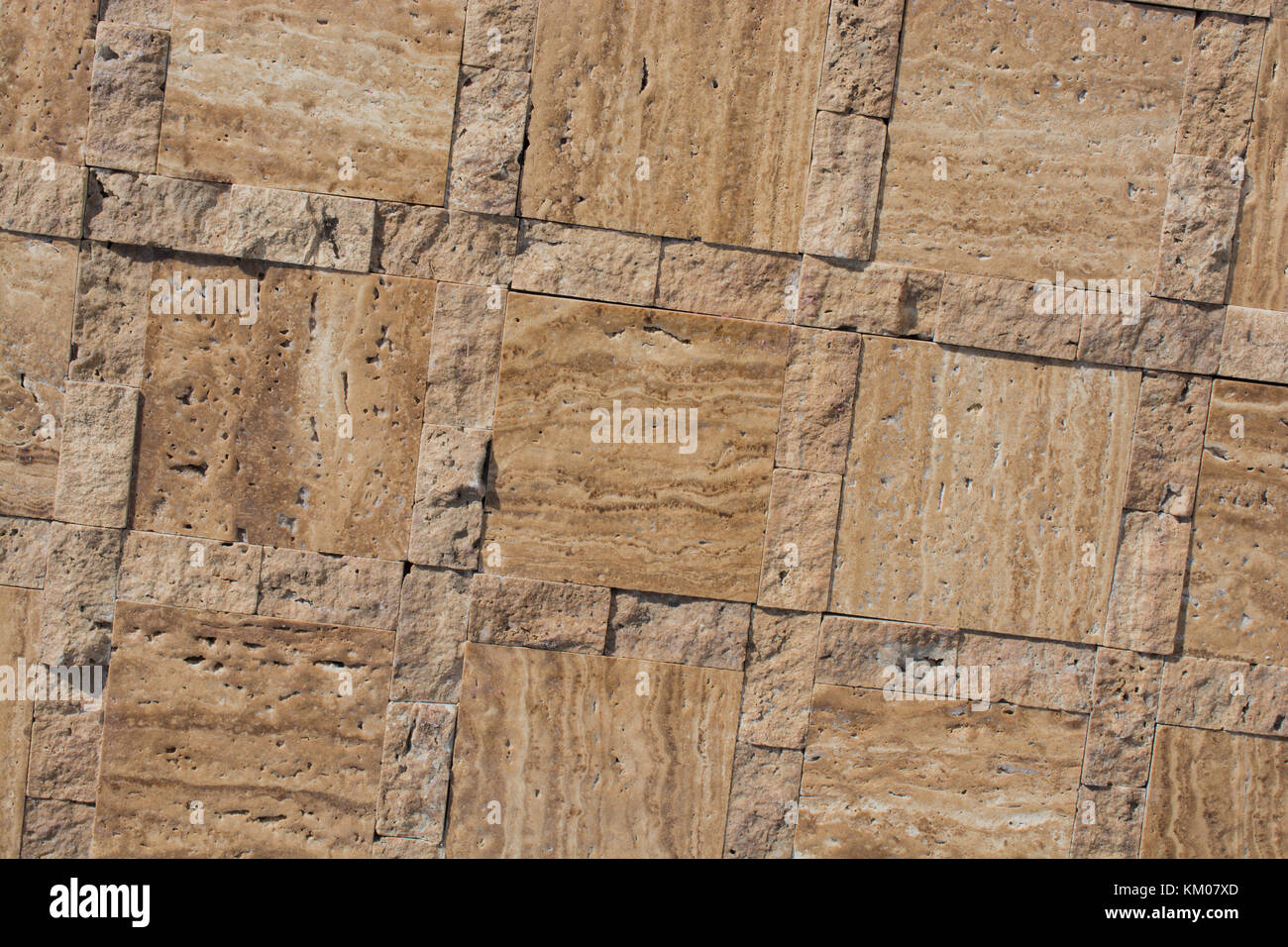 Decorative cubic stone wall as background texture Stock Photo - Alamy