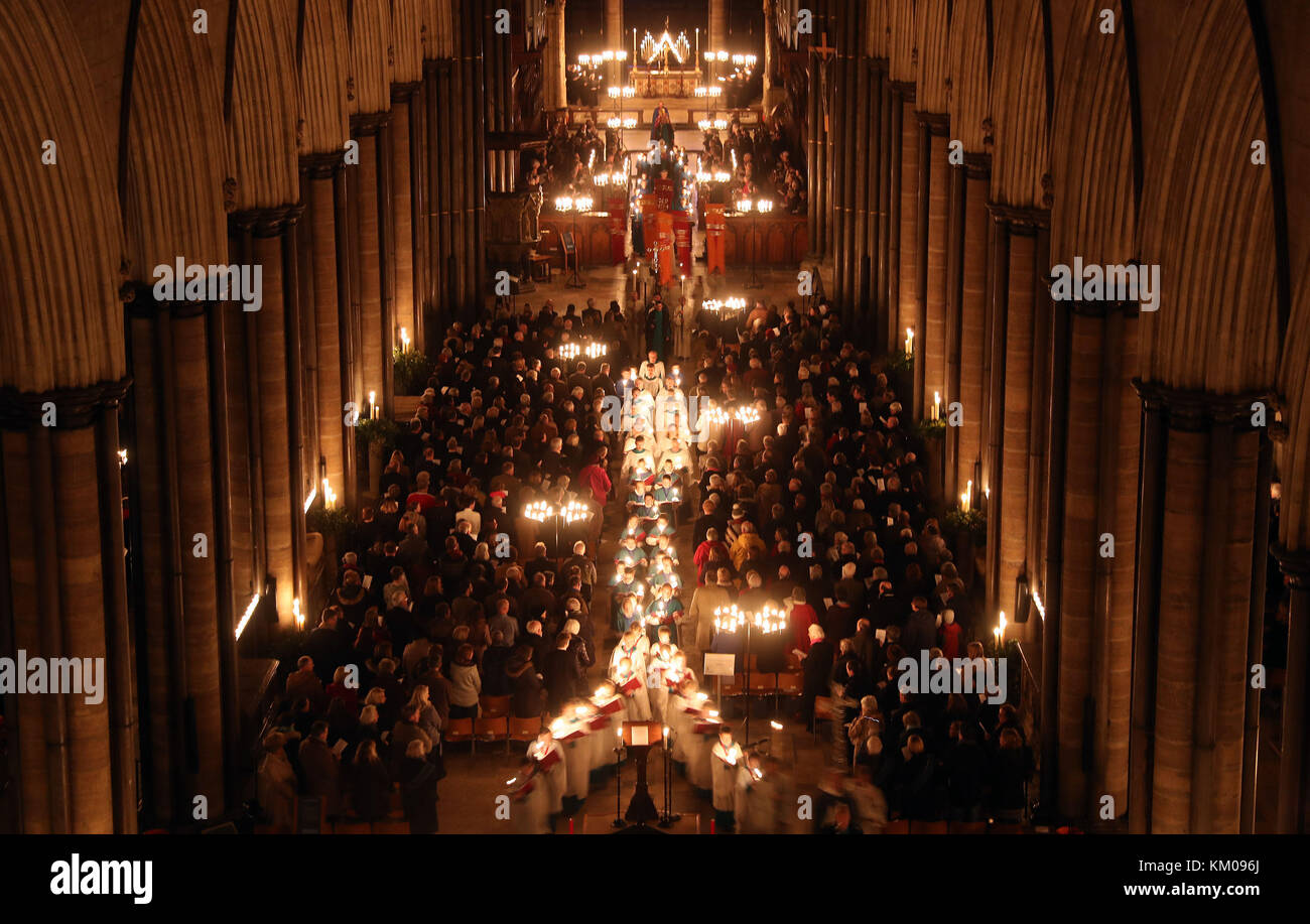 Candles are carried through Salisbury Cathedral during the advent ...