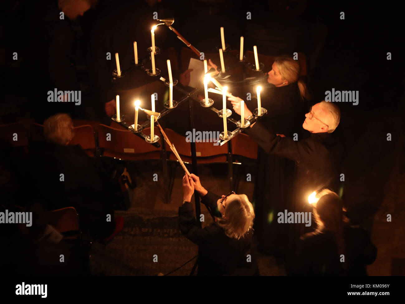 Candles are lit inside Salisbury Cathedral during the advent procession ...