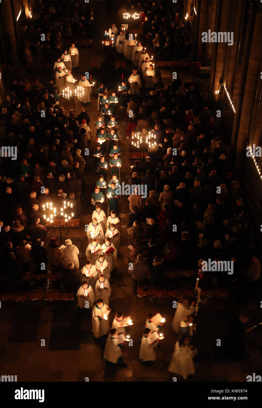 Candles are carried through Salisbury Cathedral during the advent ...