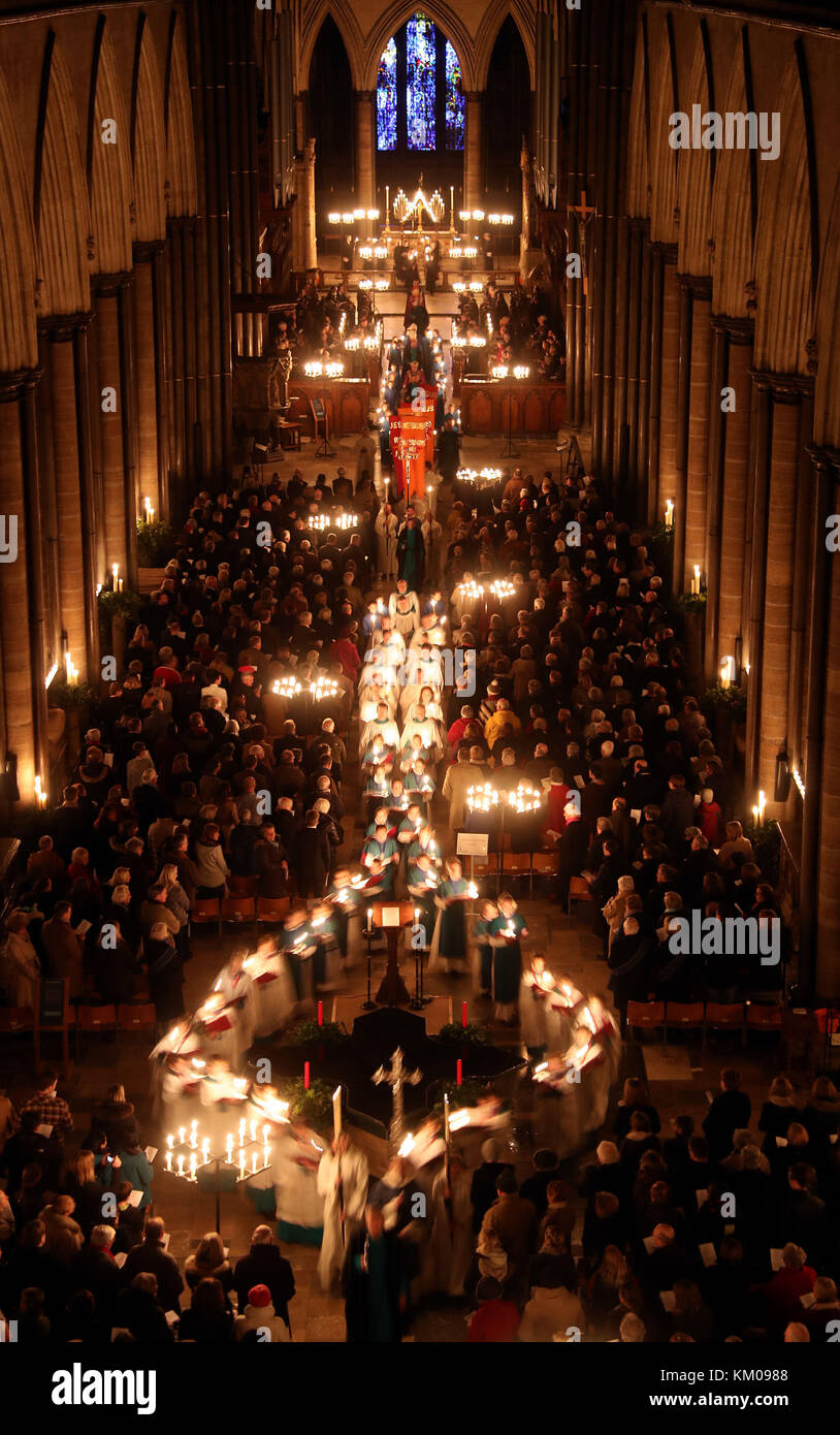 Candles are carried through Salisbury Cathedral during the advent ...