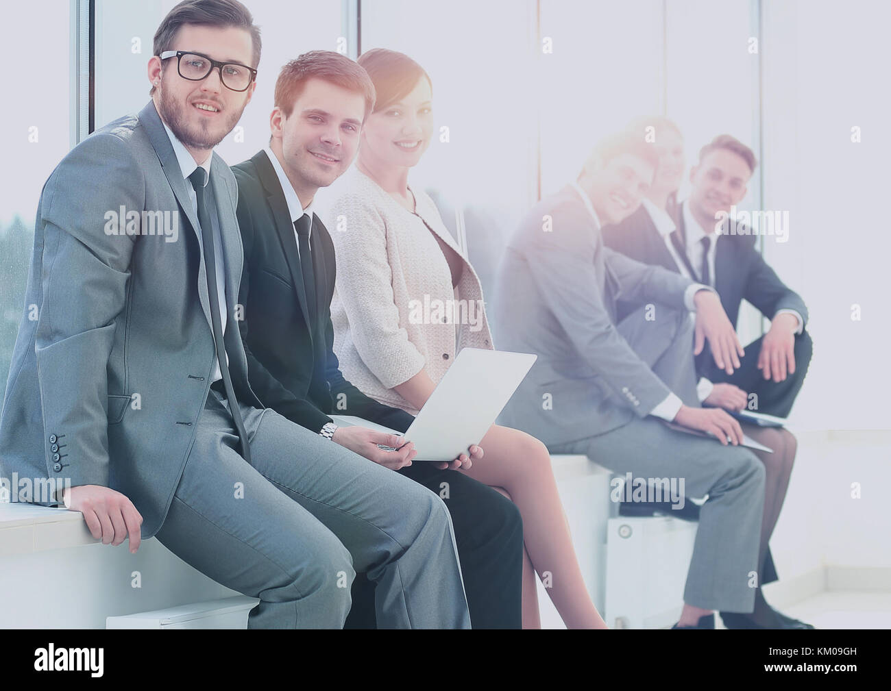 Business Team Having Informal Meeting In Office Stock Photo - Alamy