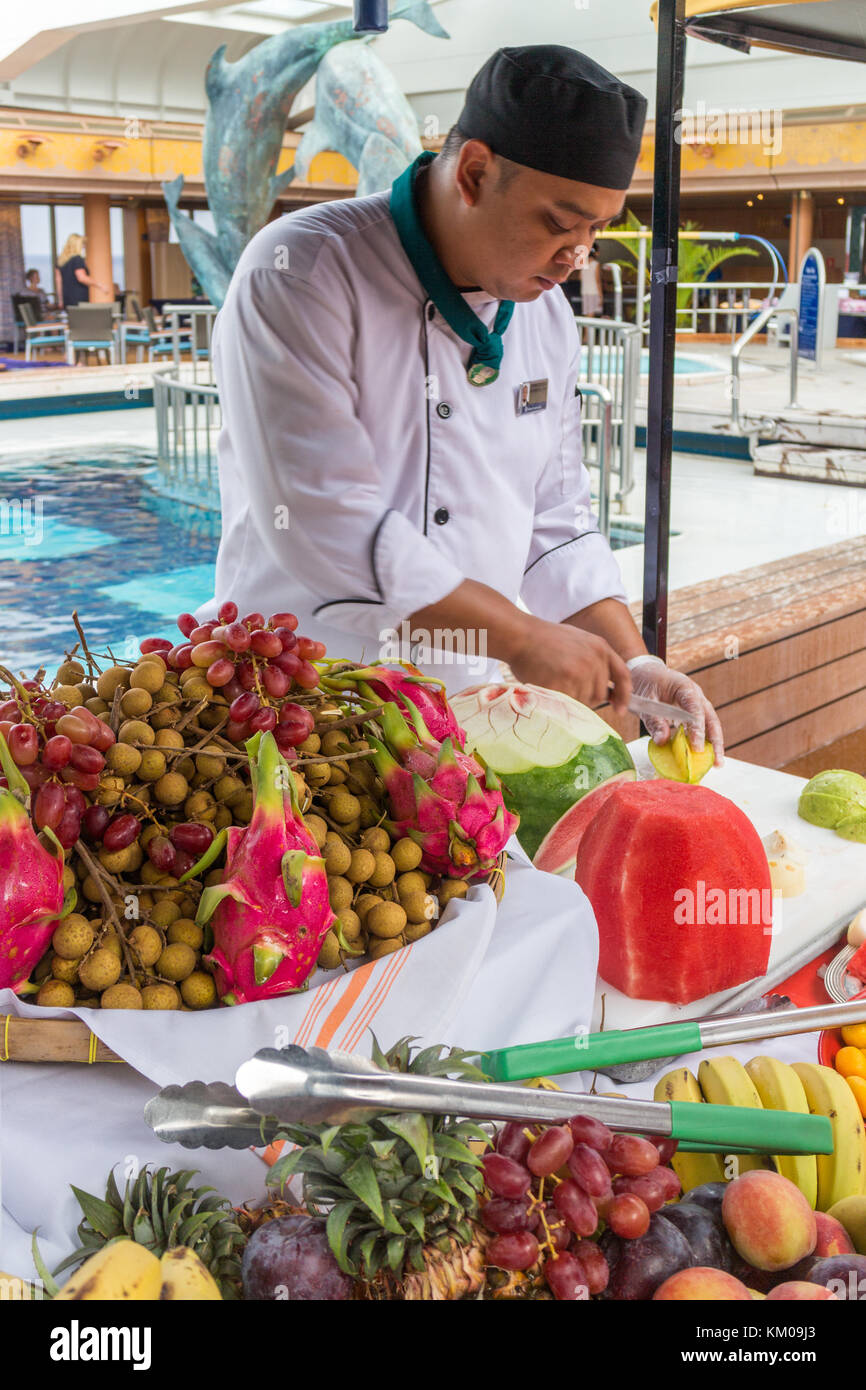Chef carving fruit on board the Holland America line cruise ship ...