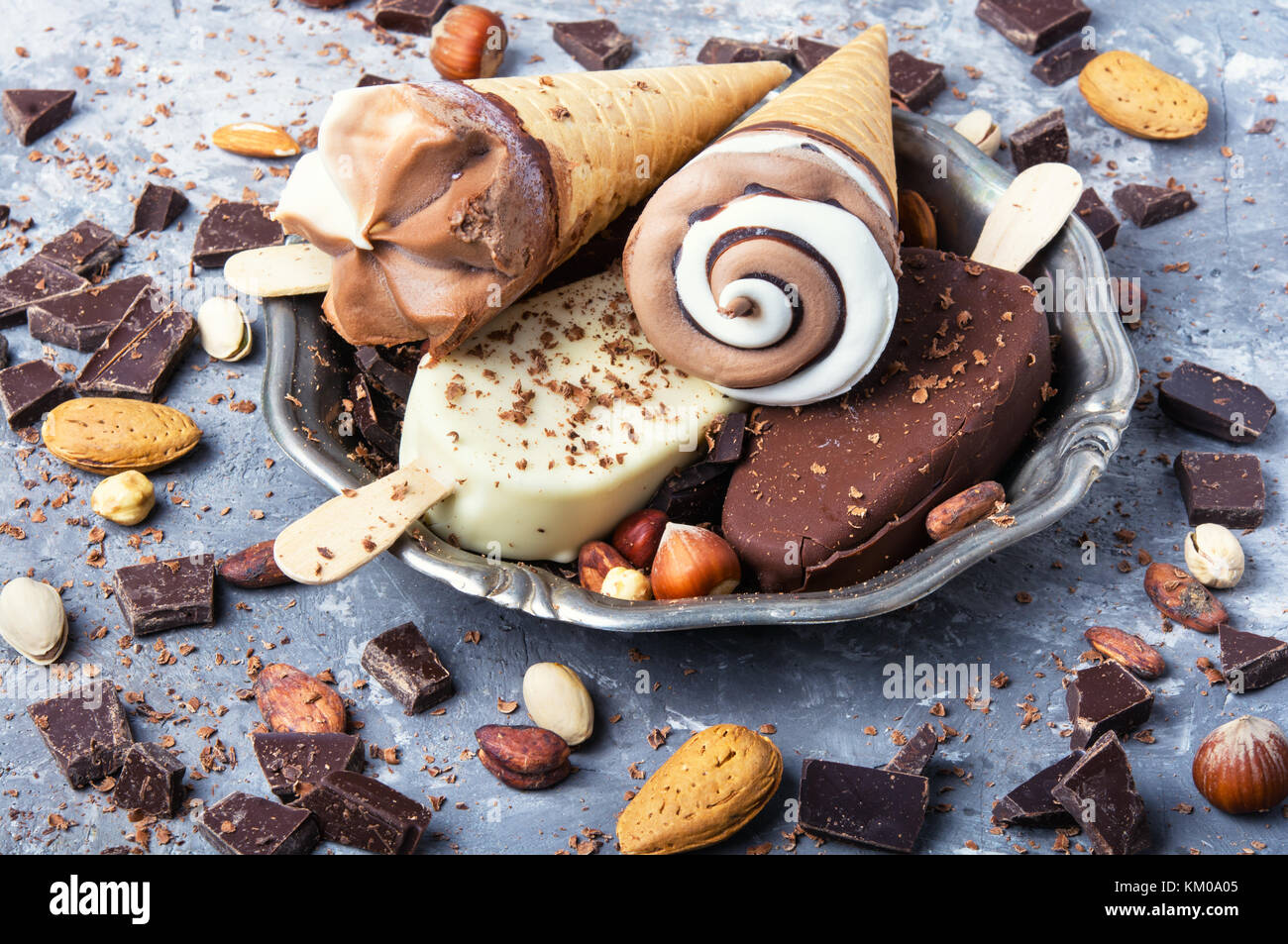 tray with summer ice cream with chocolate filling and nuts Stock Photo ...