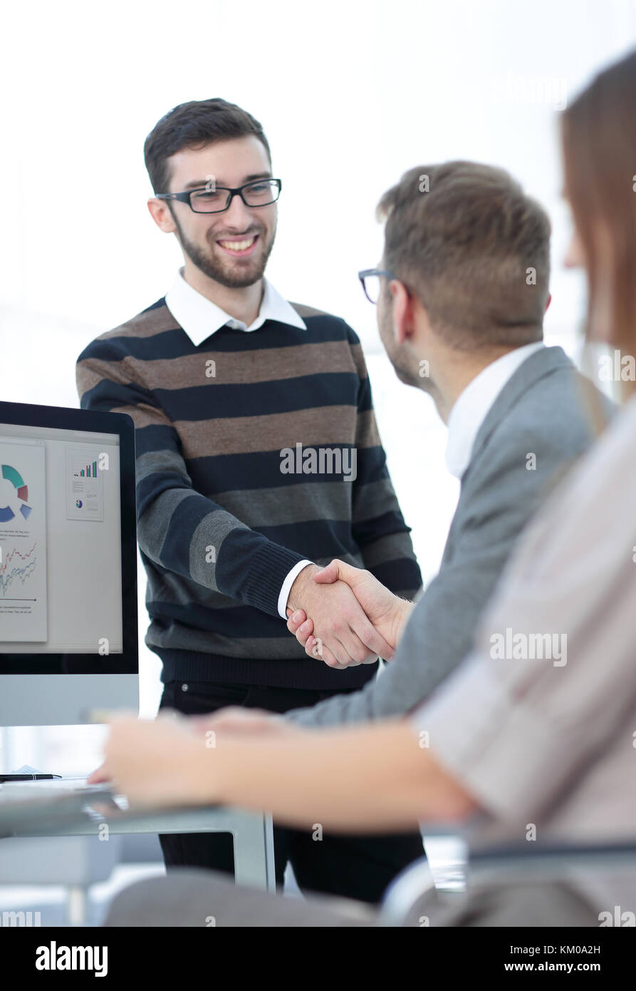handshake Manager and the client Stock Photo - Alamy