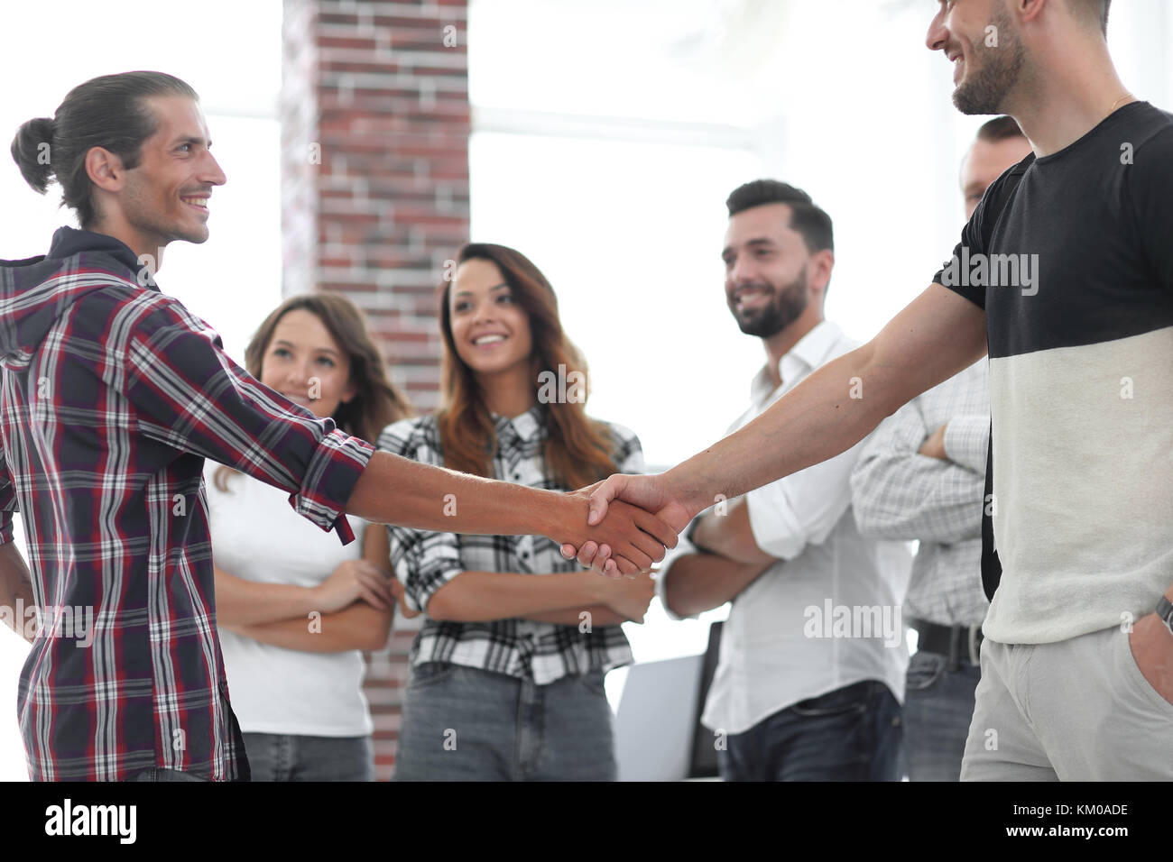 handshake Manager and customer in the office Stock Photo - Alamy