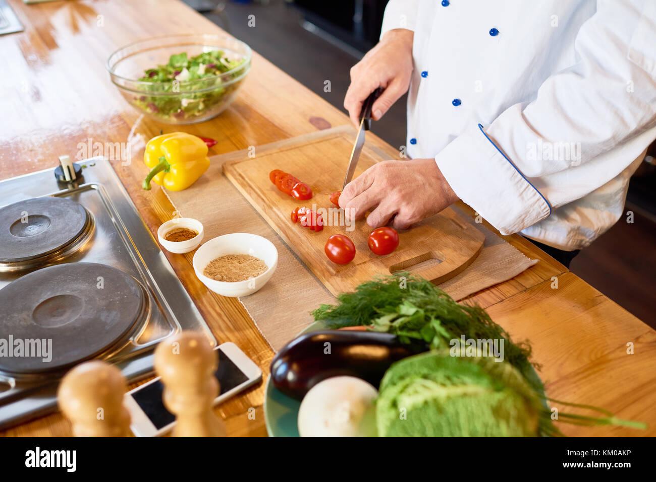 Chef Wrapped up in Work Stock Photo - Alamy
