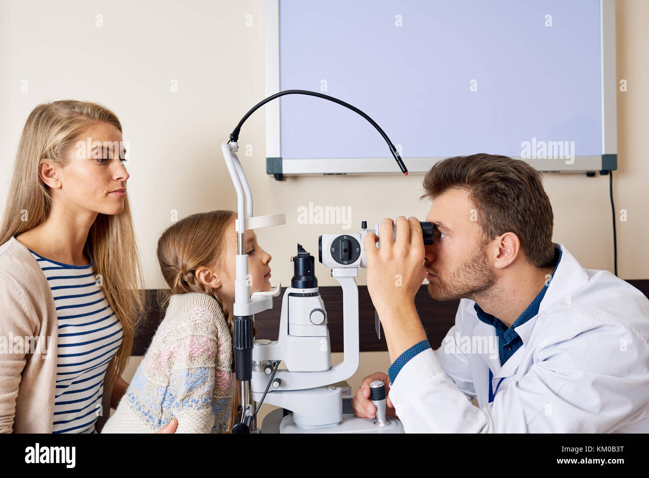Little Girl at Eye Testing Examination Stock Photo - Alamy