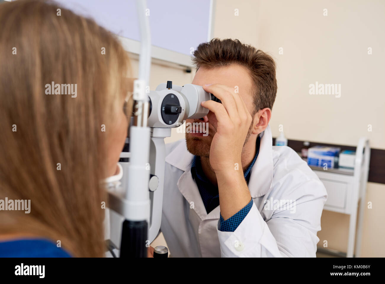 Woman getting eye check up hi-res stock photography and images - Alamy