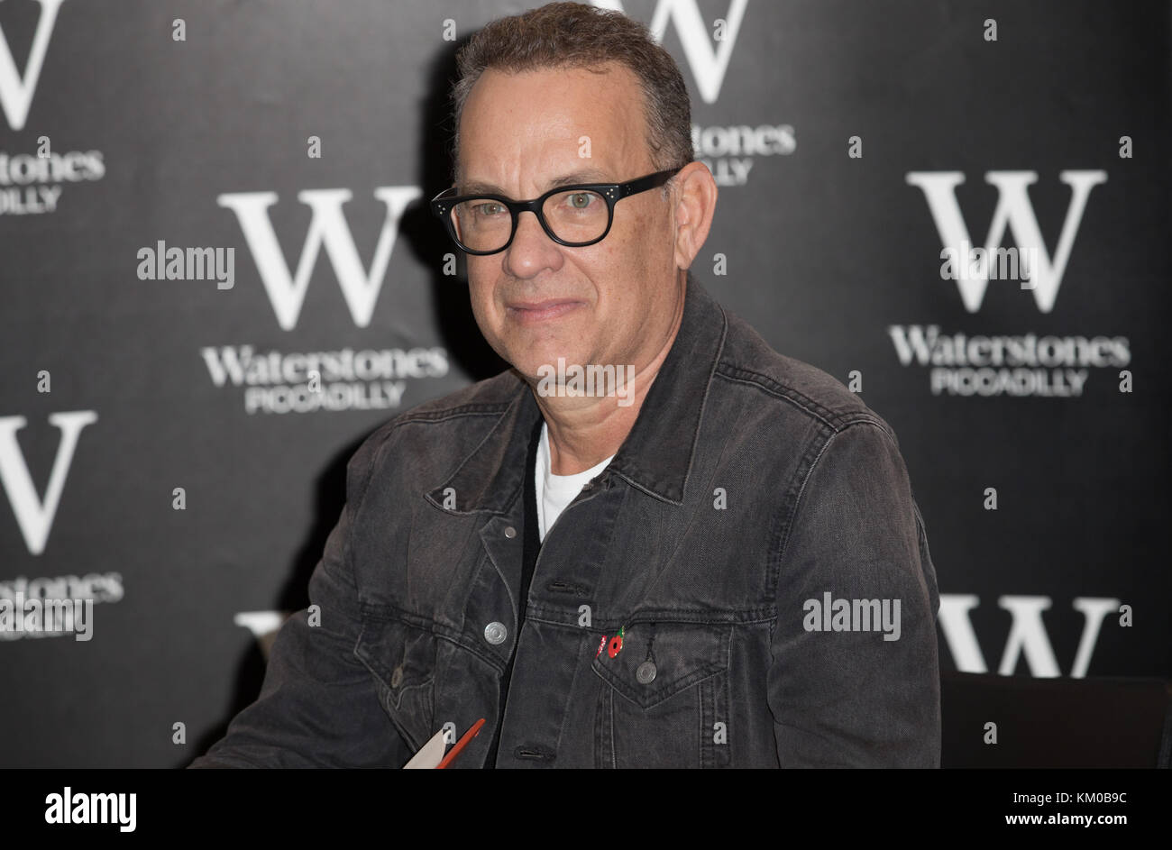 Tom Hanks signs copies of his short stories collection 'Uncommon Type ...