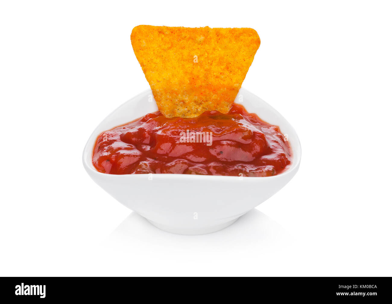 Glass container with hot pepper salsa dip nachos Stock Photo - Alamy