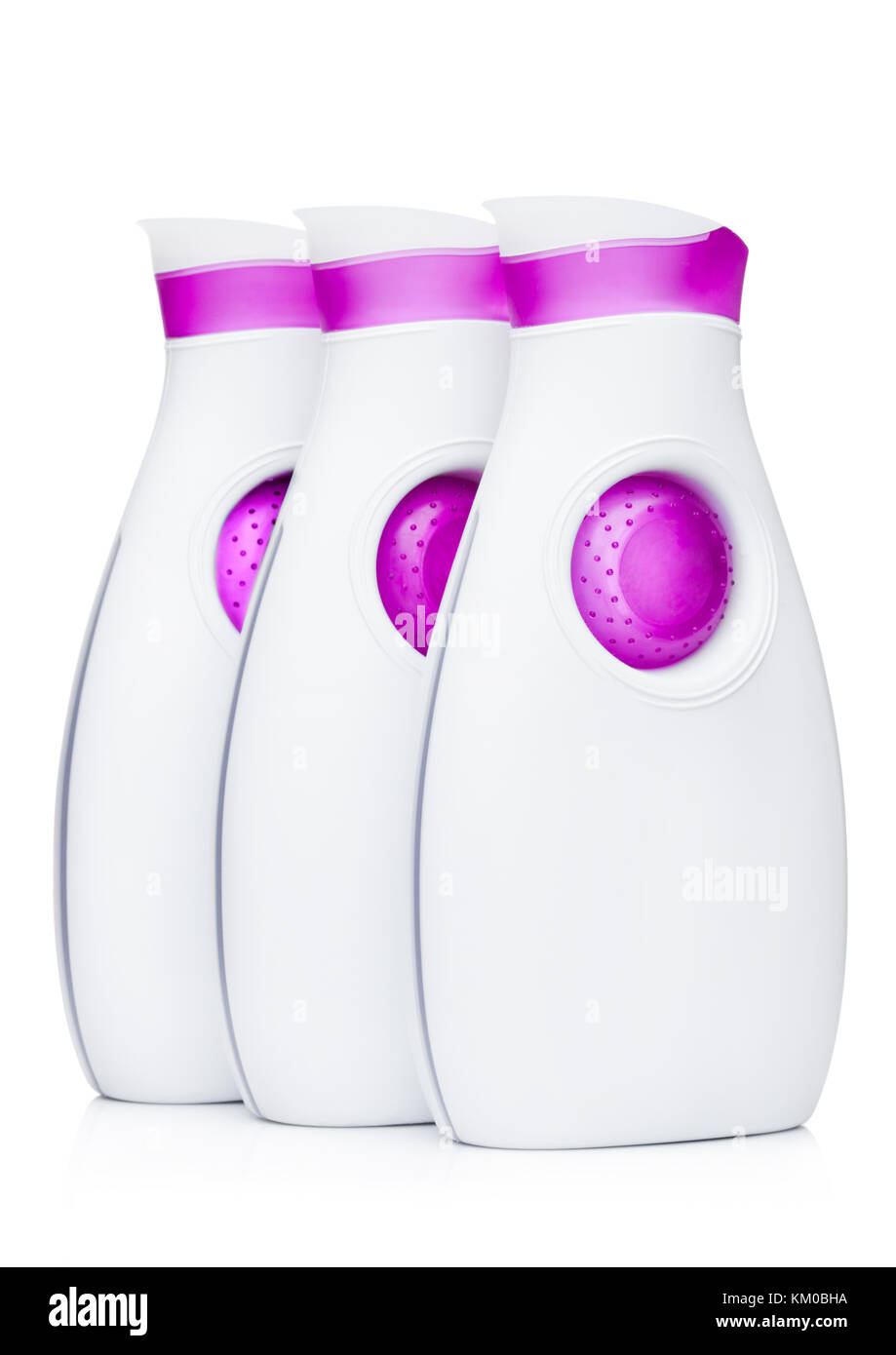 Plastic containers with liquid washing chemical on white background ...