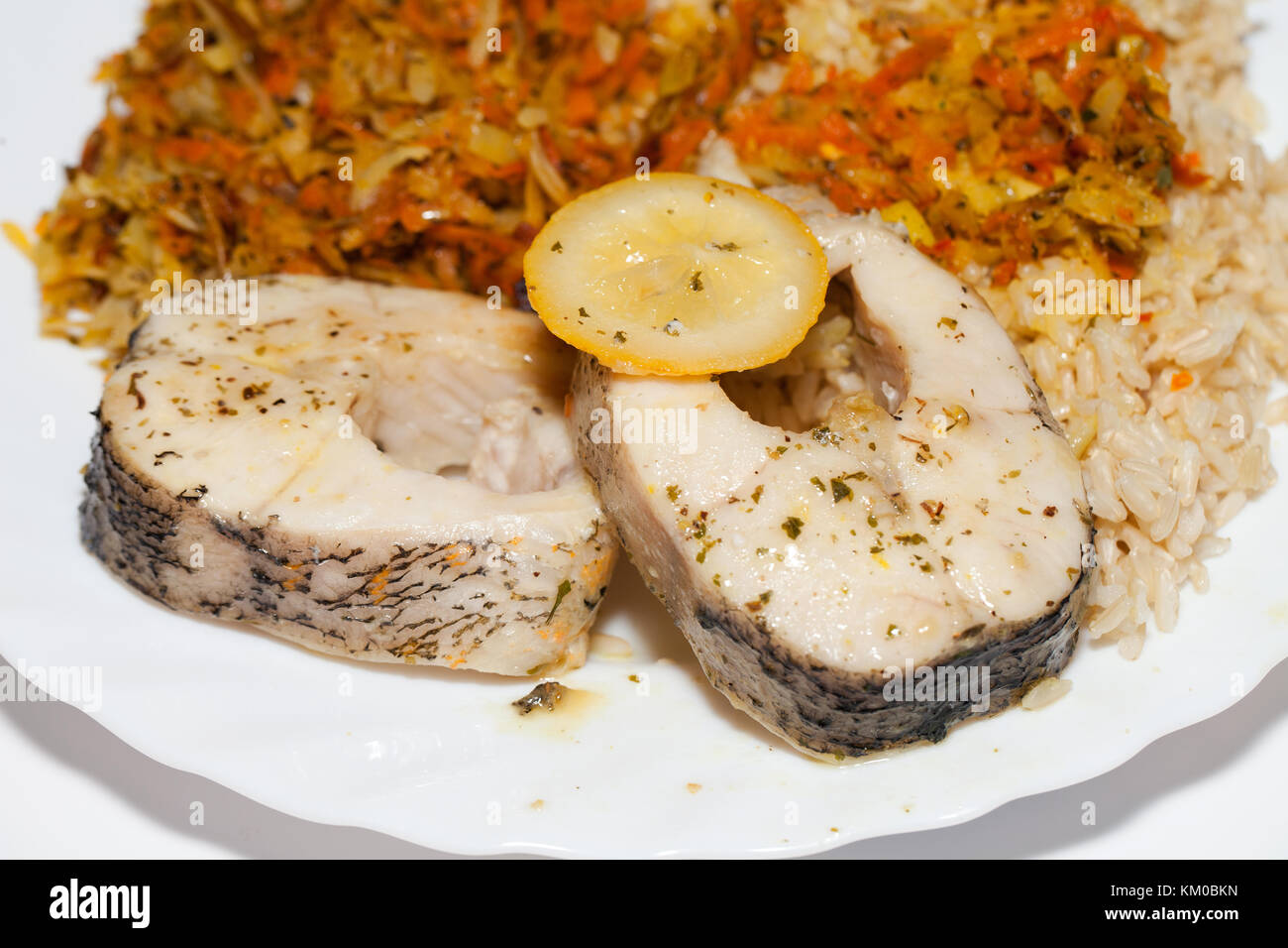 the healthy diet - brown rice with fisch and vegetable Stock Photo - Alamy