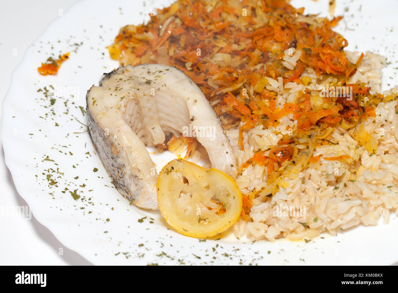the healthy diet - brown rice with fisch and vegetable Stock Photo - Alamy