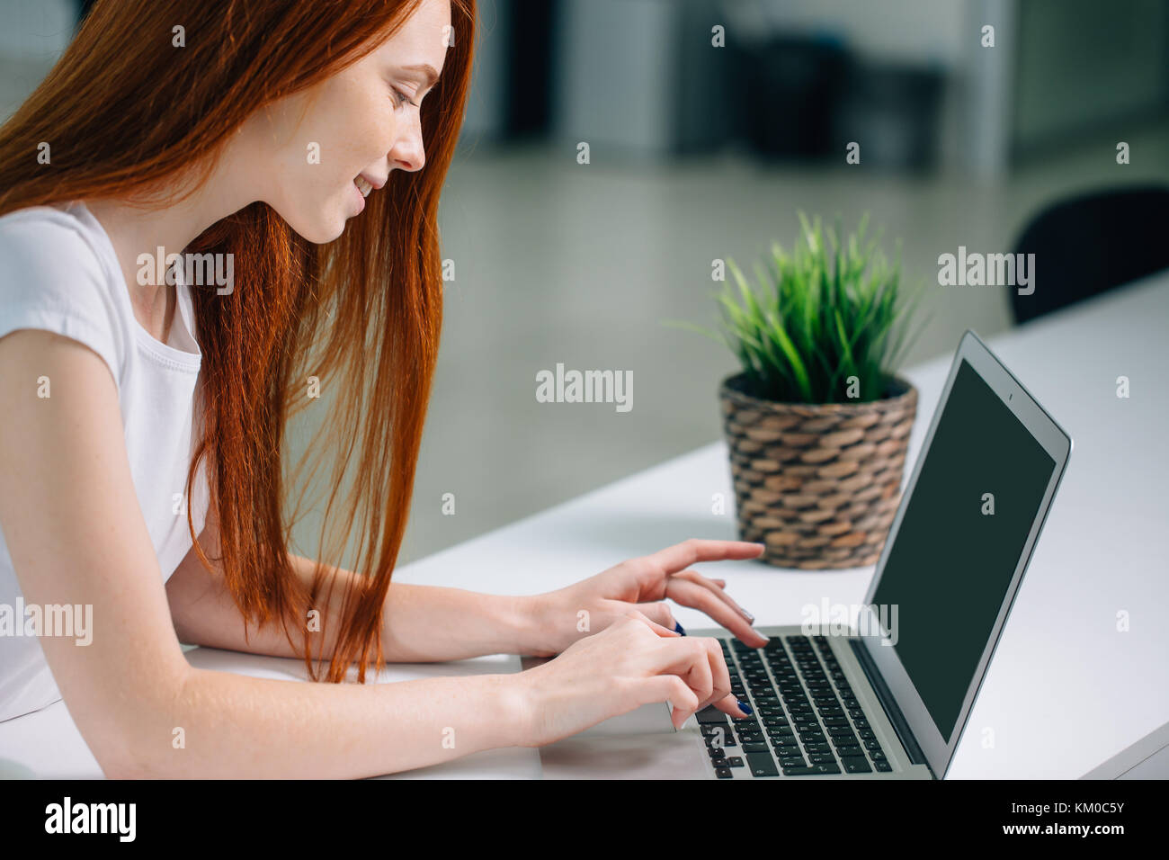 woman typing on laptop at workplace Woman working in home office hand ...