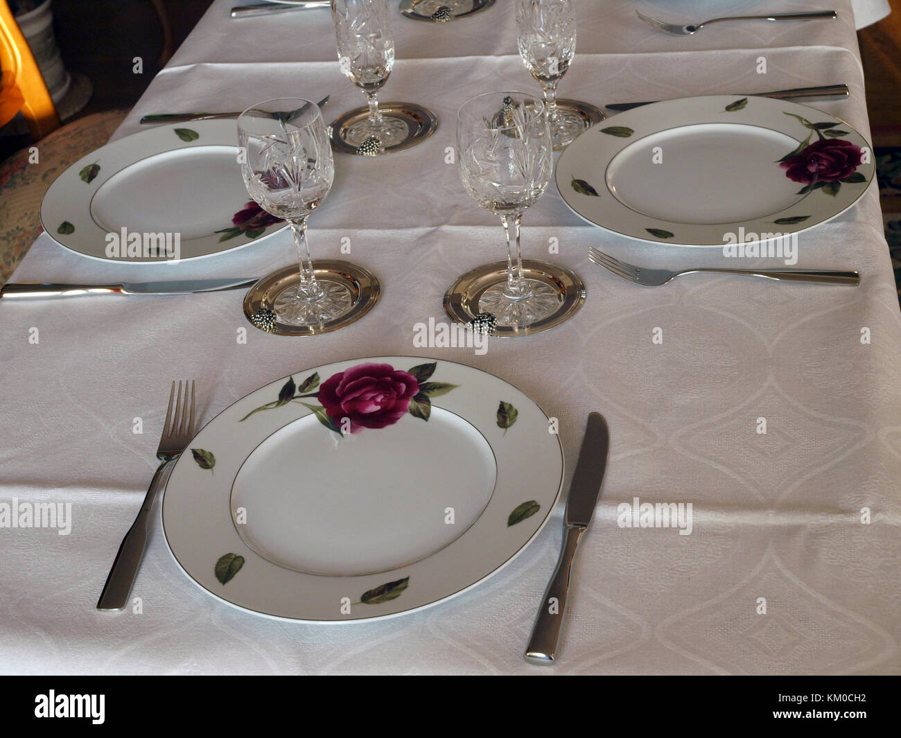 Elegantly set dining room table Stock Photo - Alamy